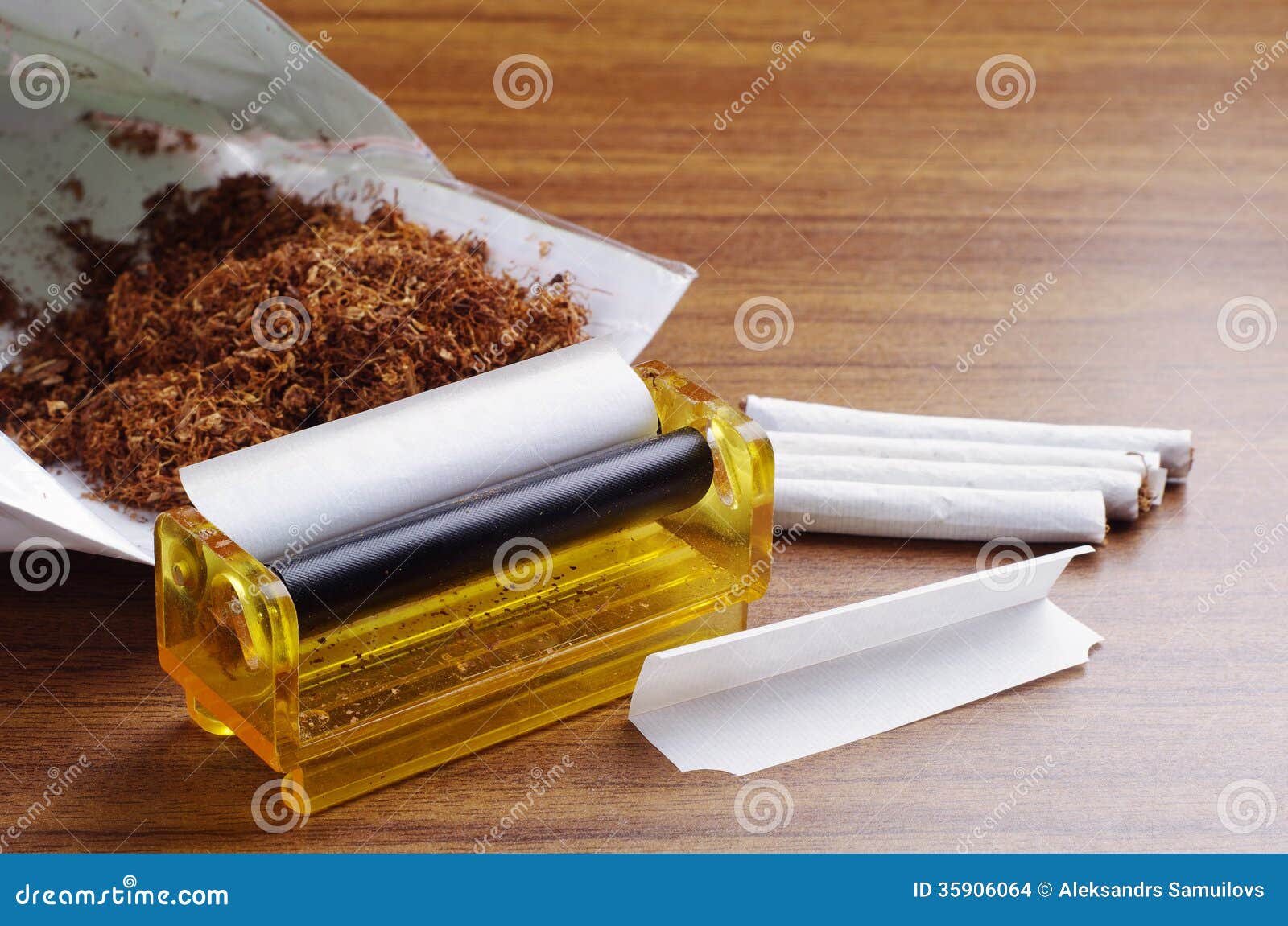 Tobacco and Rolling Machine Stock Photo - Image of brown, flavor: 35906064