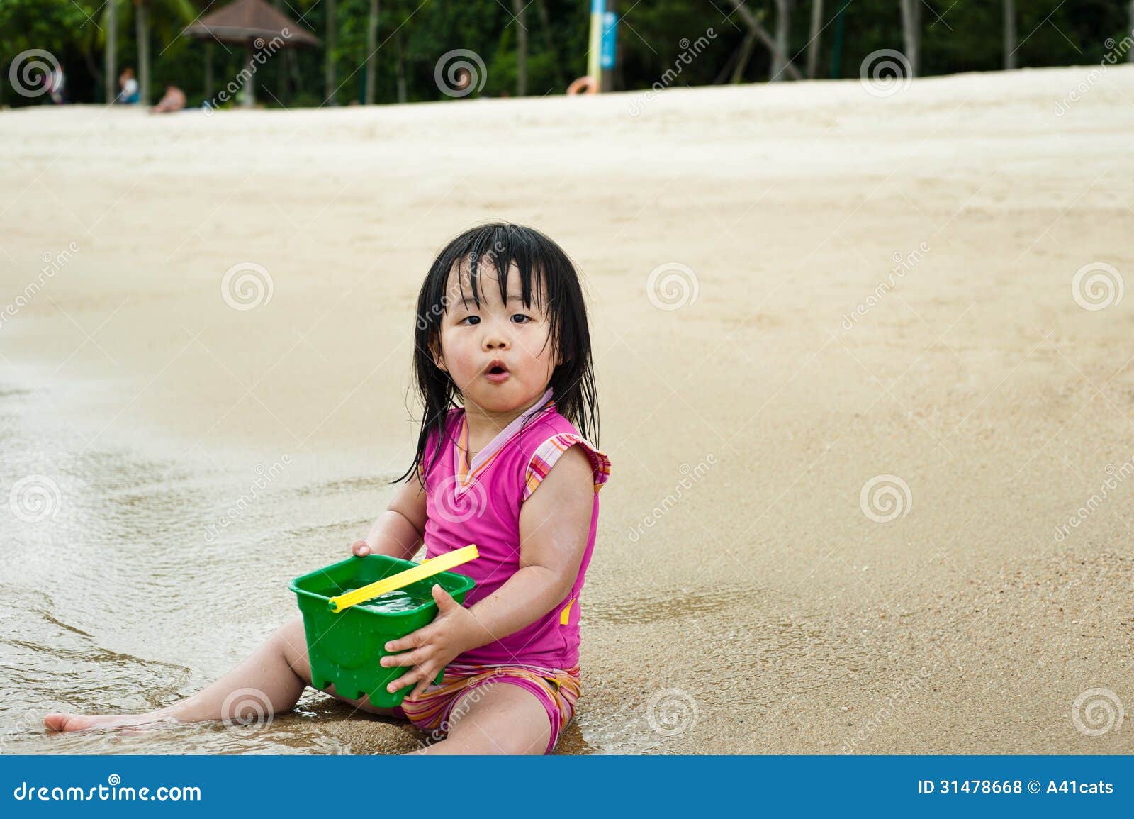 Toddler at the beach stock photo. Image of people, pink - 31478668