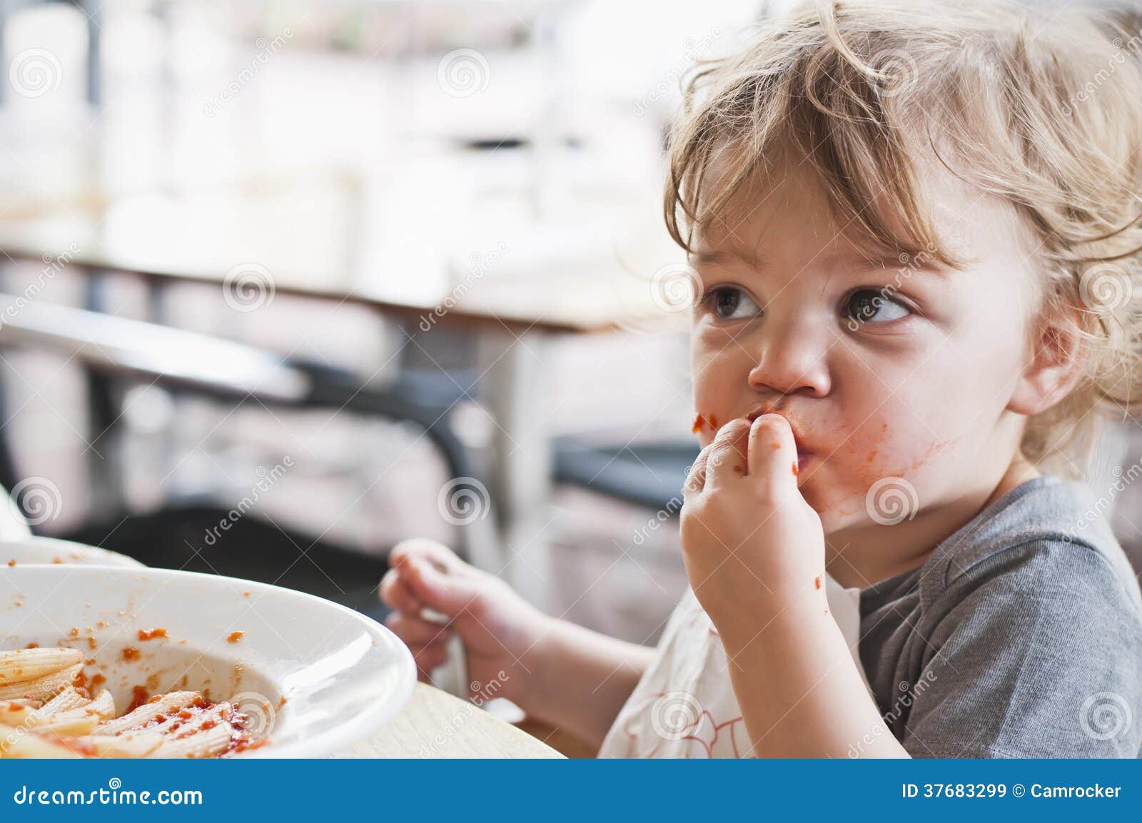 Toddler Boy Eating Pasta stock image. Image of hunger - 37683299