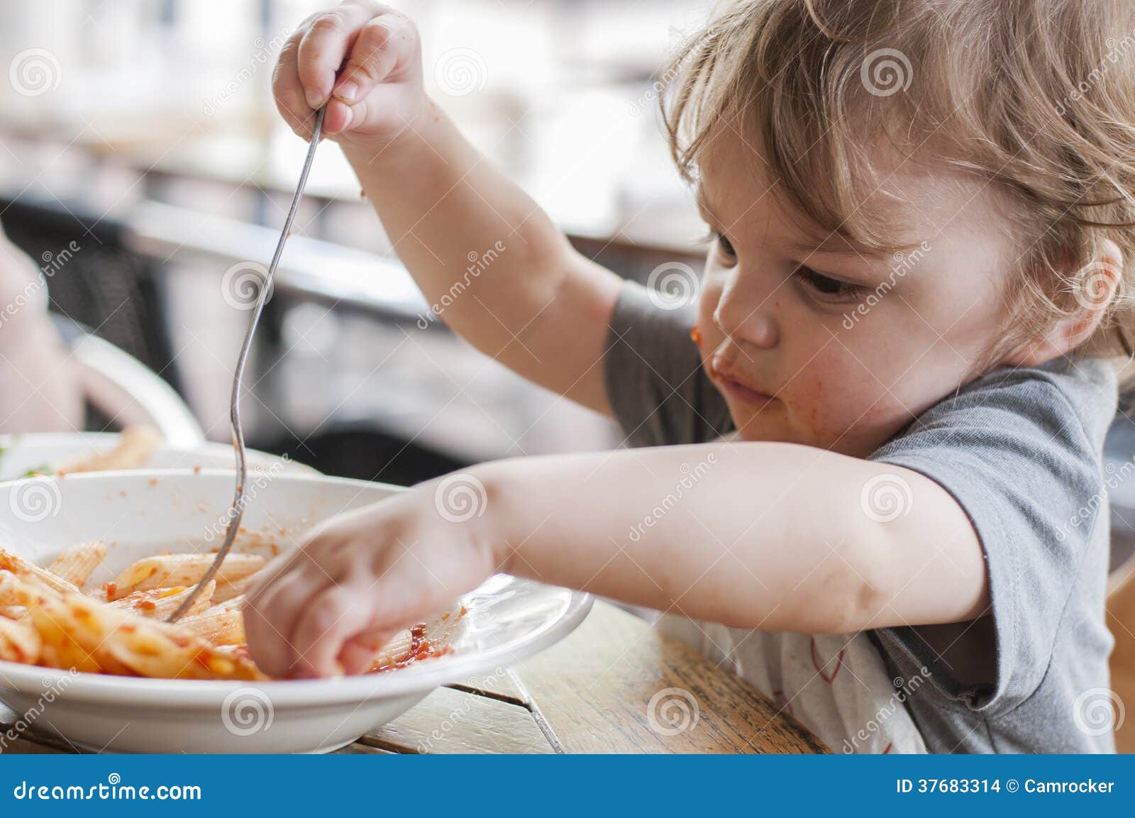 Toddler Boy Eating Pasta stock photo. Image of sauce - 37683314