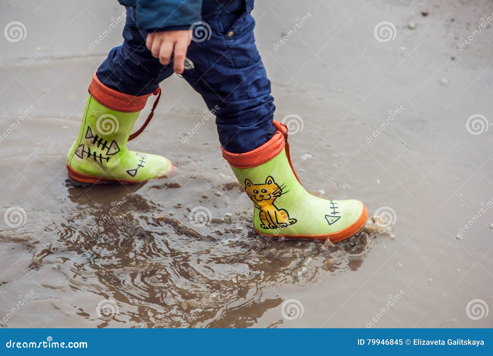 Toddler Boy Jumping in the Puddles Stock Image - Image of action ...