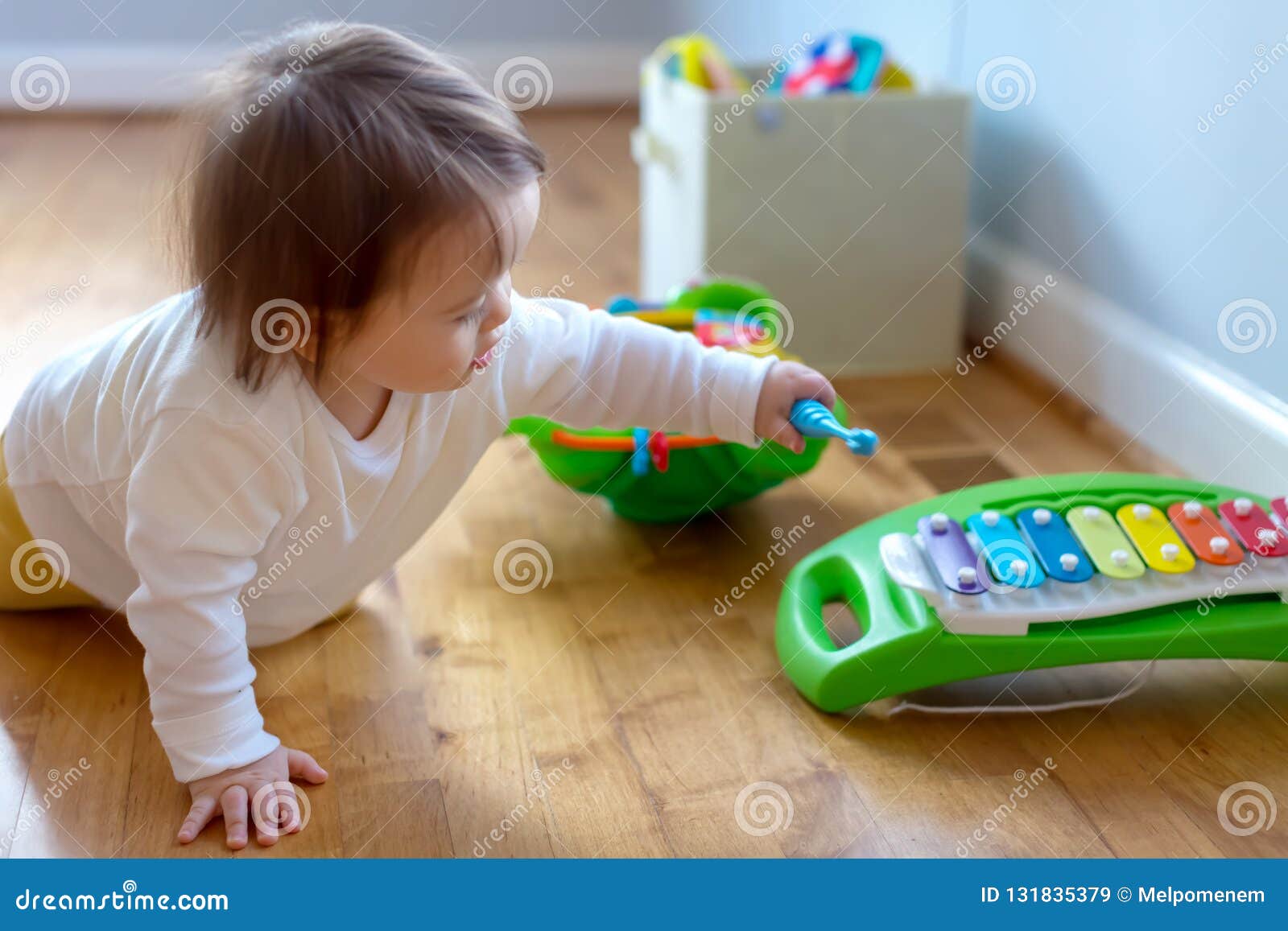 Toddler Boy Playing a Musical Instrument Stock Image - Image of musical ...