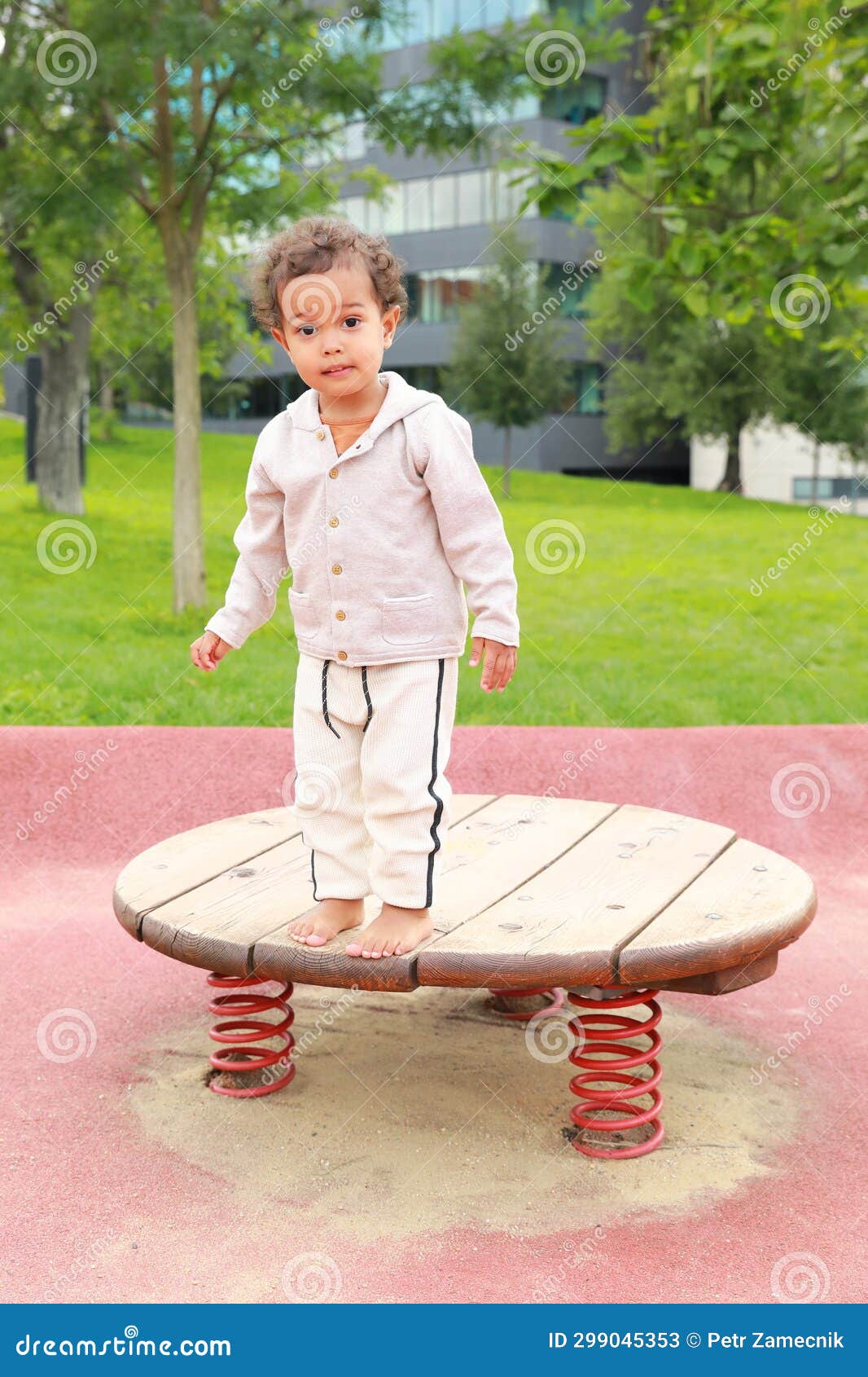 Toddler Boy Playing on Playground - Standing on Spring Platform Stock ...