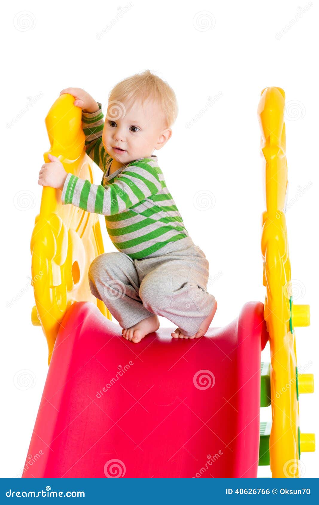 Toddler Boy Playing on the Slide Stock Photo - Image of blond ...
