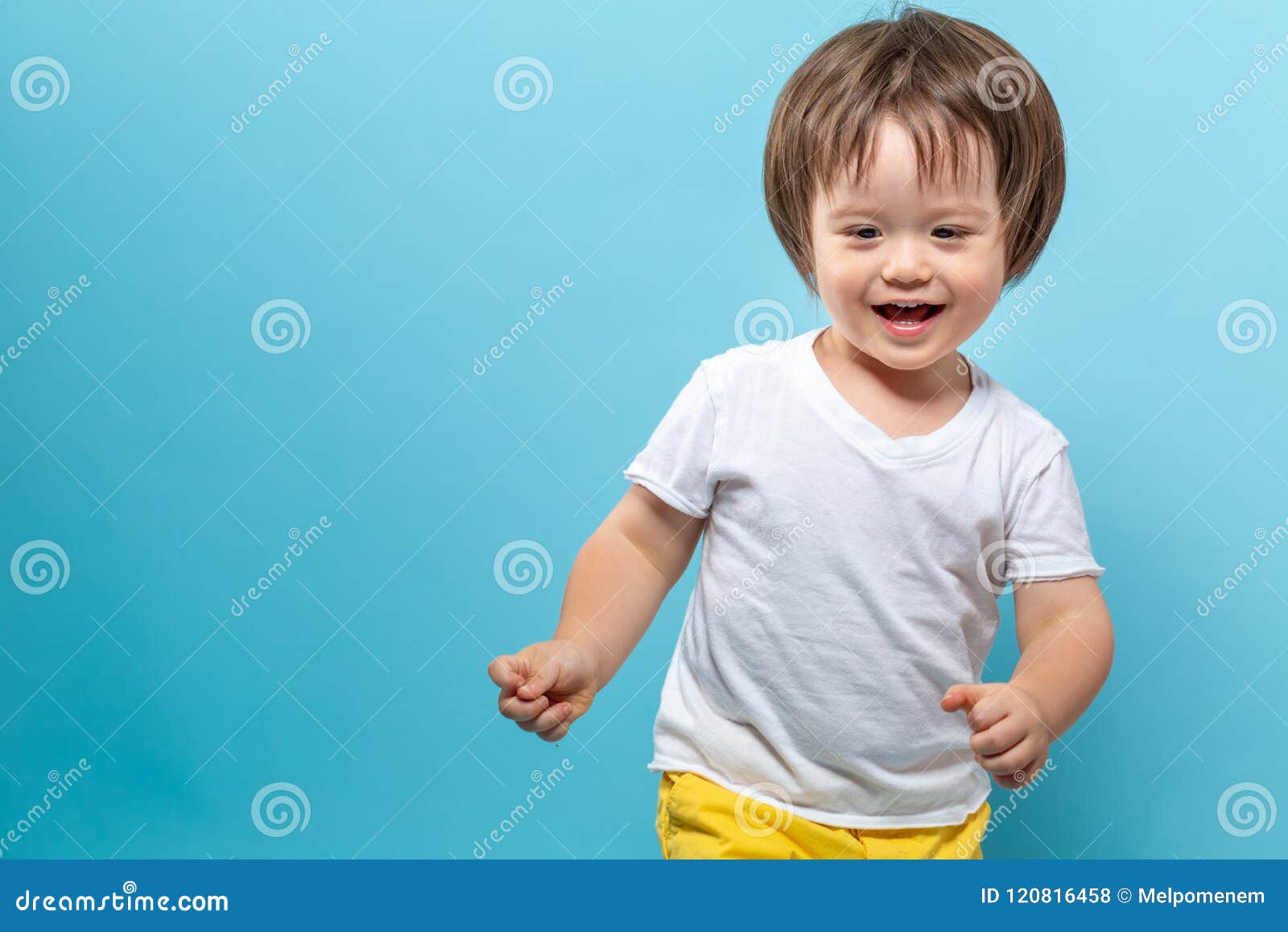 Toddler Boy Smiling on a Blue Background Stock Photo - Image of happy ...