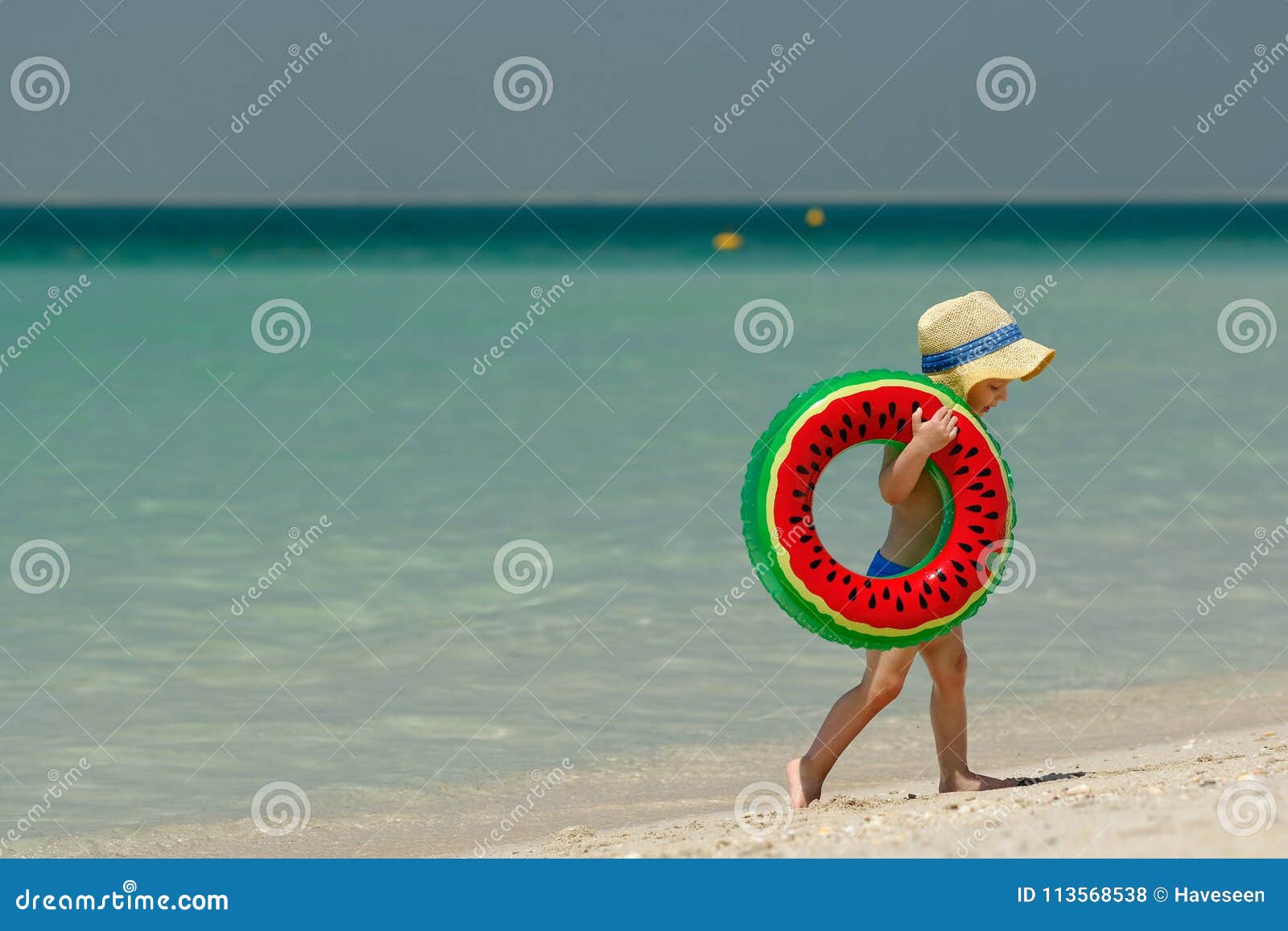 Toddler Boy with Swim Ring on Beach Stock Photo - Image of summer ...