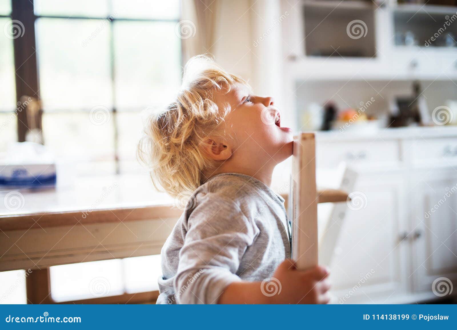A Toddler Boy at the Table at Home. Stock Image - Image of childhood ...