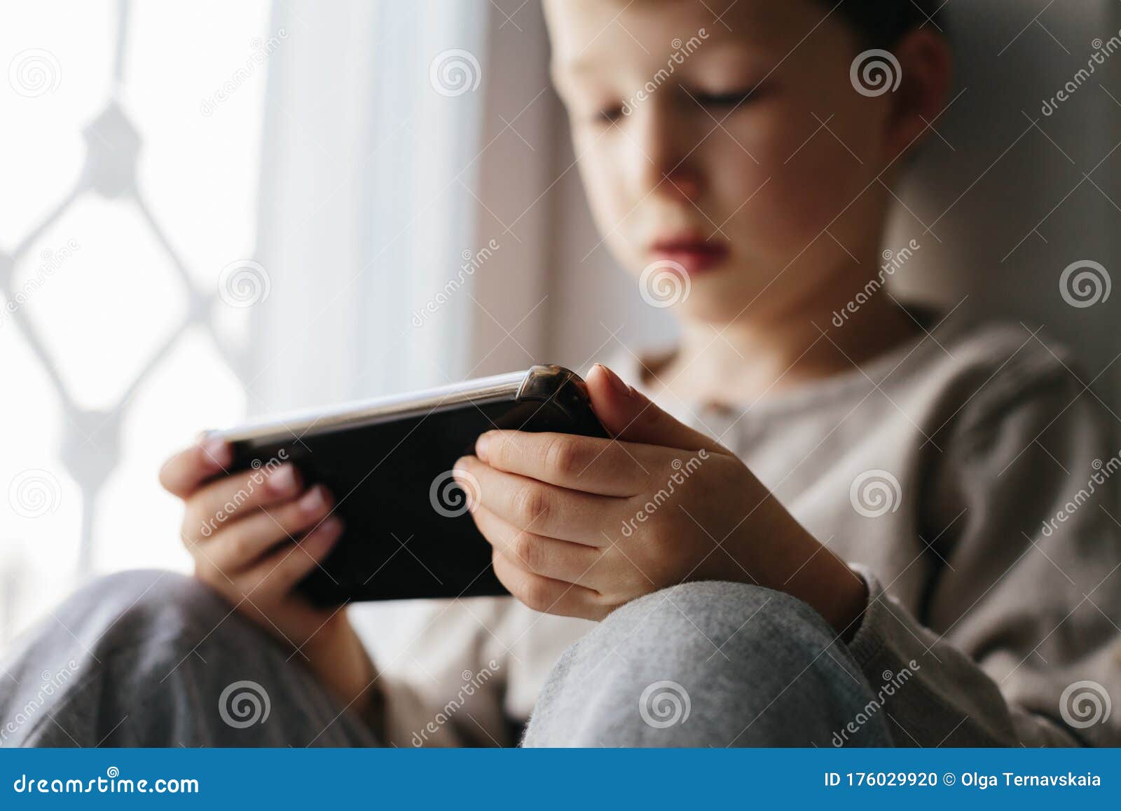 Toddler Boy Using Tablet or Smartphone. Cute Five Years Old Boy Sitting ...