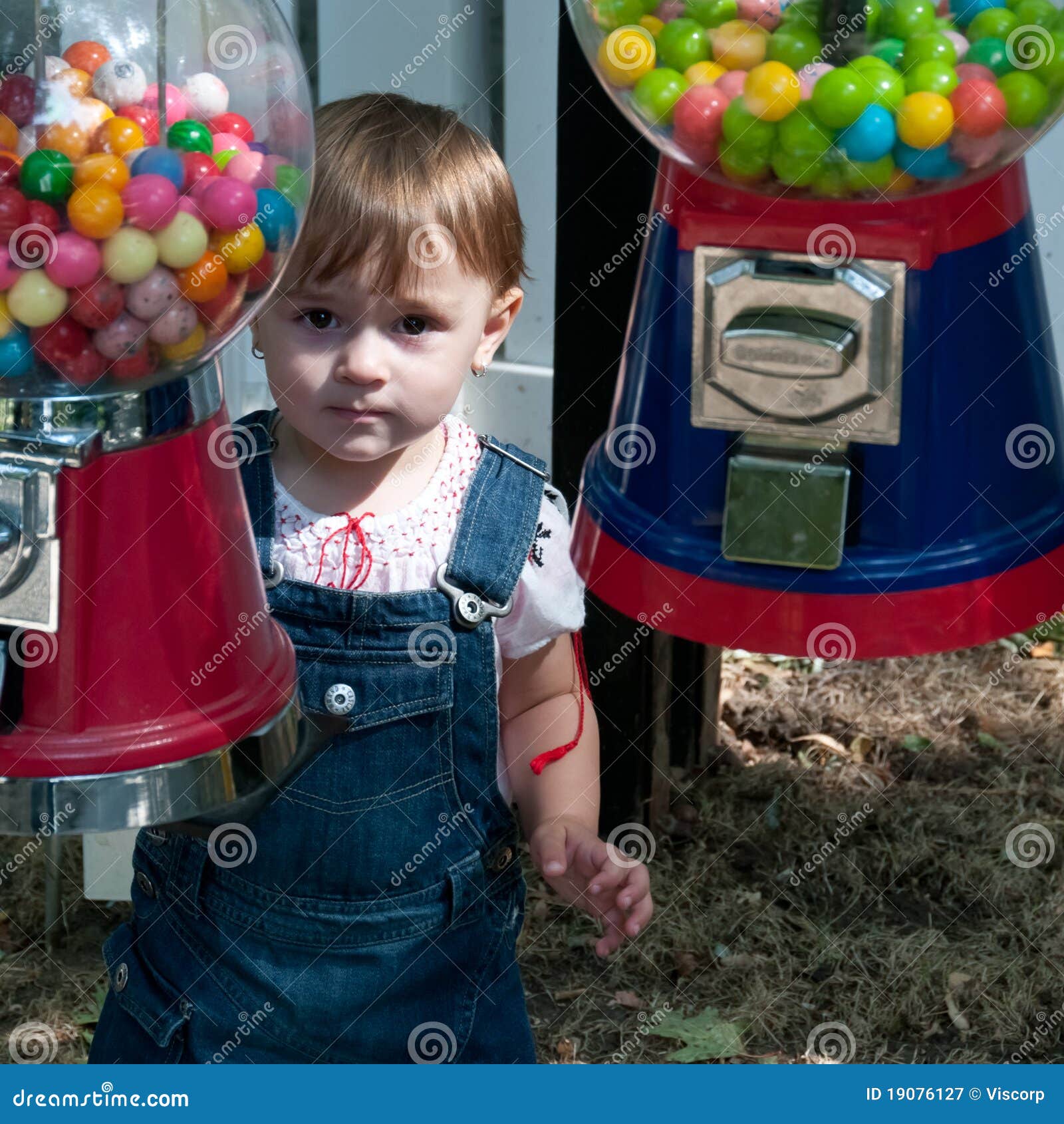 Toddler between candy bins stock image. Image of beauty - 19076127