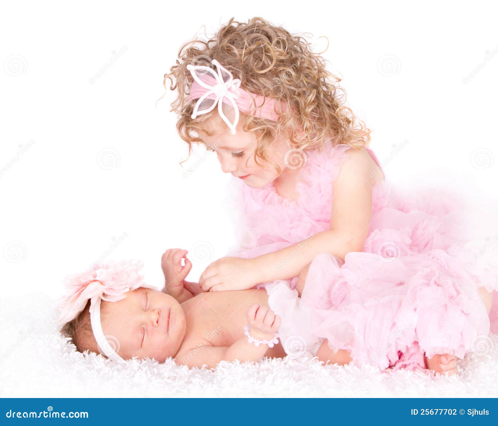 Toddler Caring for Her Infant Sister Stock Photo - Image of funny ...