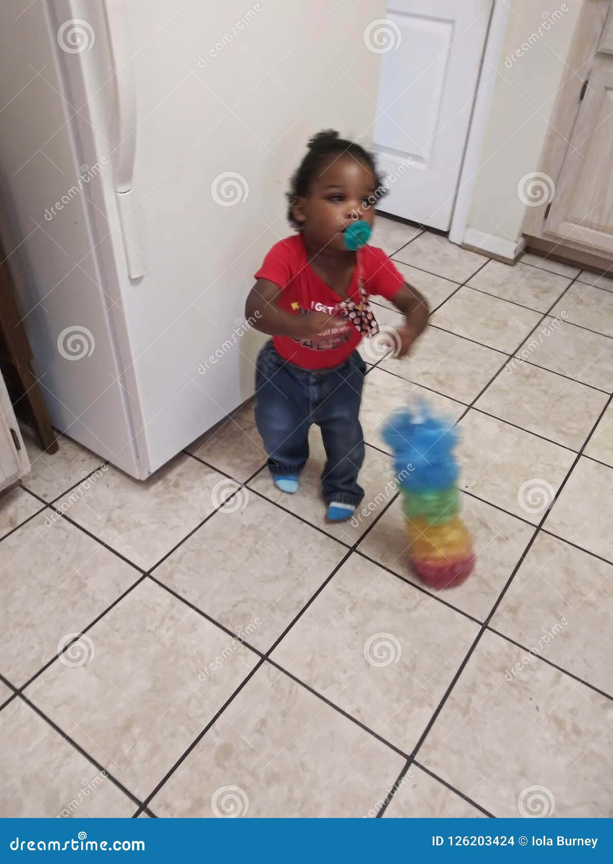 Toddler dusting for mommy stock photo. Image of cleaning - 126203424