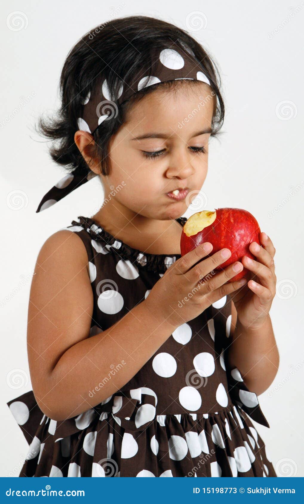 Toddler eating apple stock image. Image of eating, food - 15198773
