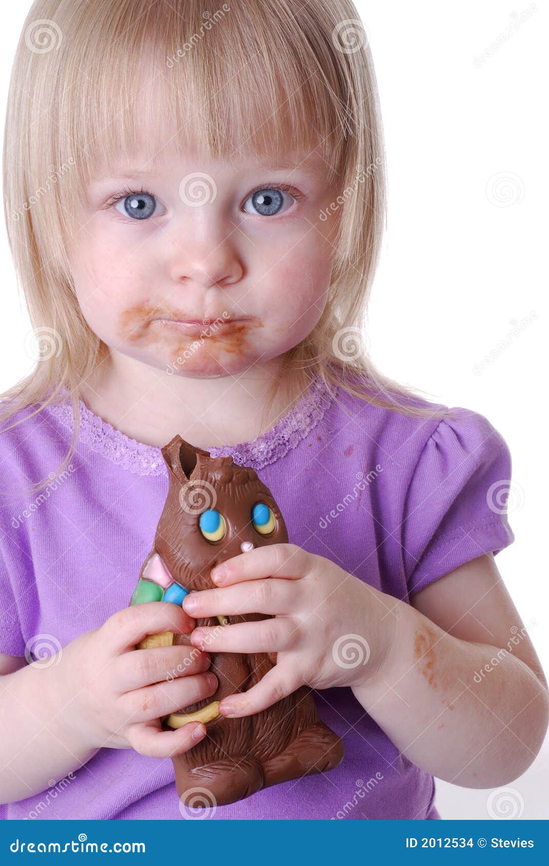 Toddler Eating Chocolate Bunny Stock Photo - Image of rabbit, long: 2012534