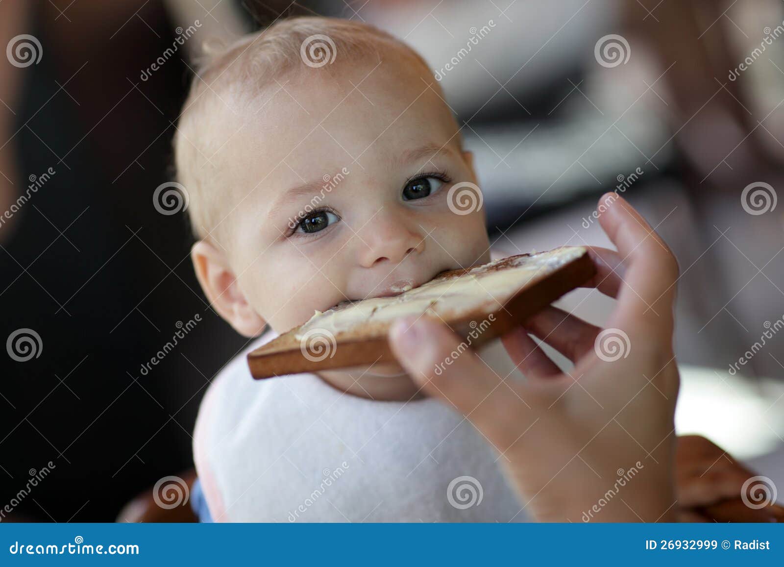 Toddler eating toast stock image. Image of cuisine, offspring - 26932999