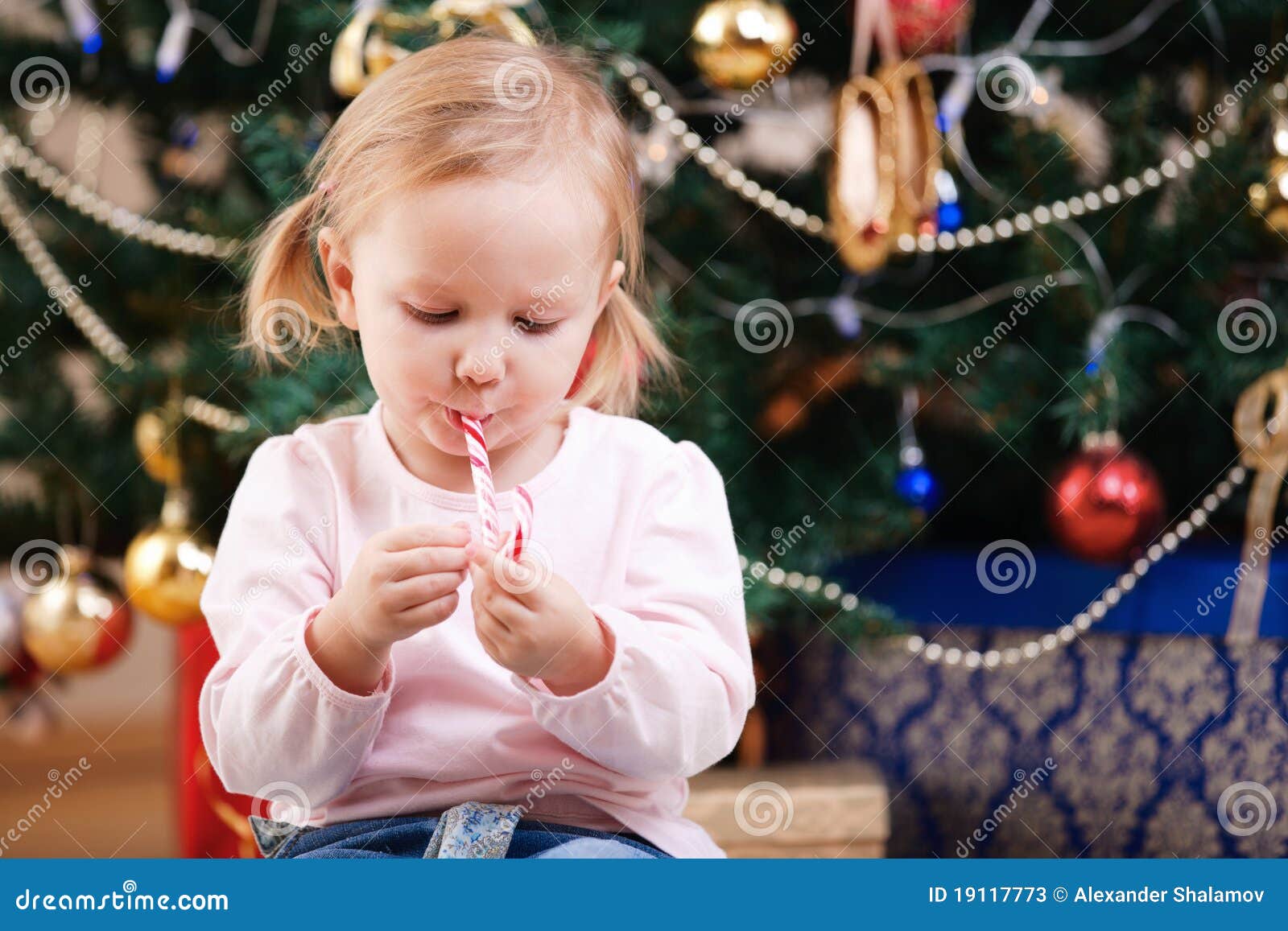 Toddler Girl with Christmas Candy Stock Image - Image of childhood ...