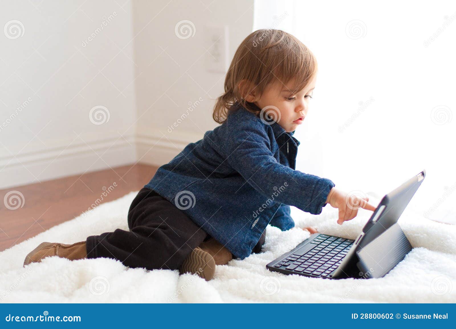 Toddler Girl Plays with IPad Notebook Stock Photo - Image of pretty ...