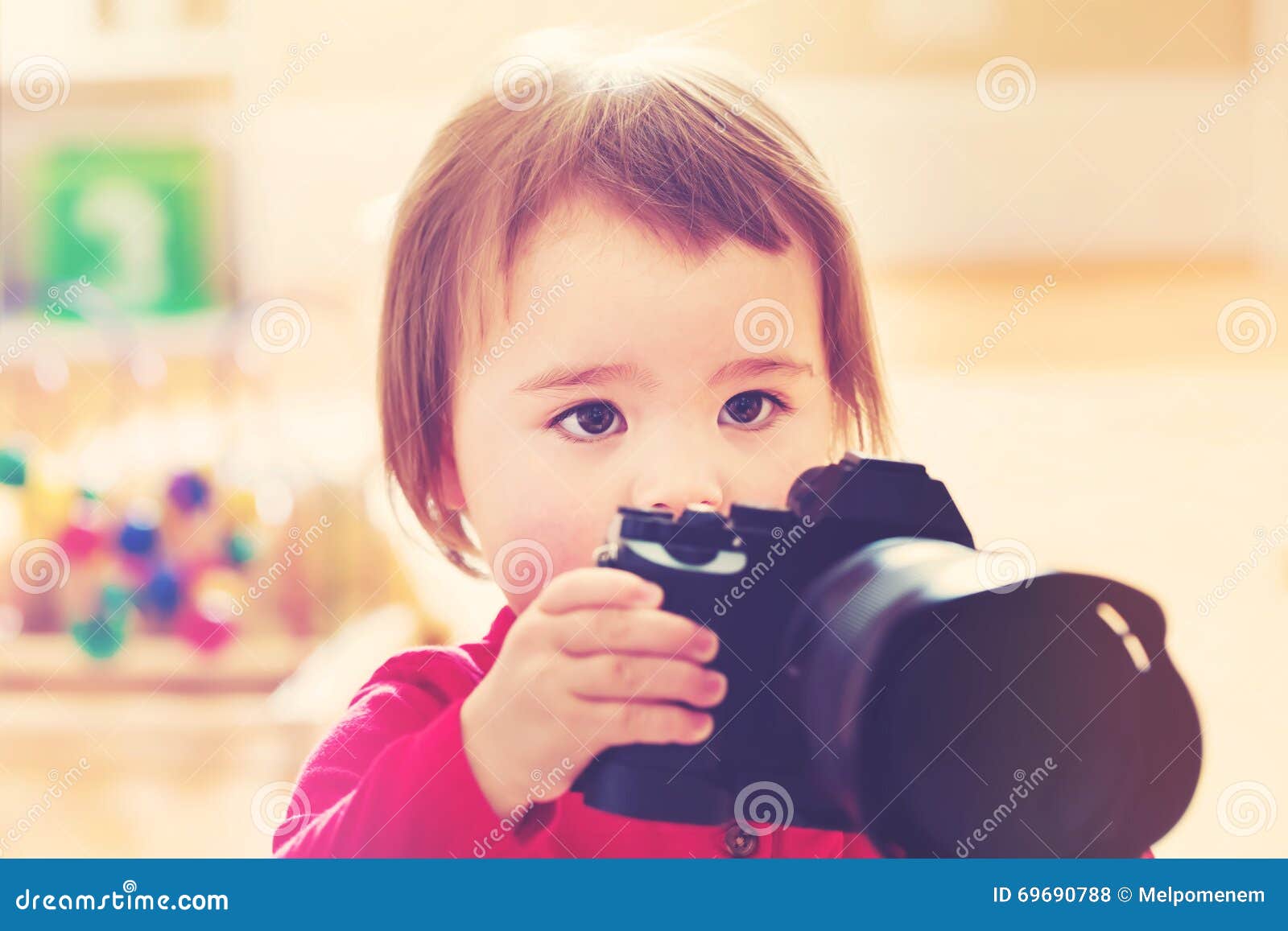 Toddler Girl Using Playing with a Camera Stock Photo - Image of little ...