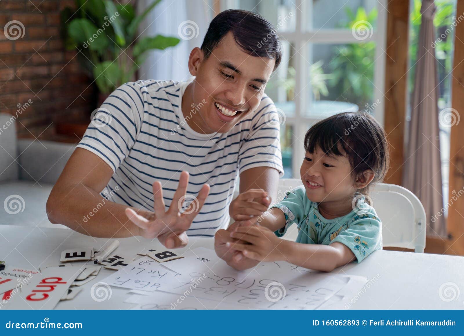 Toddler Learning Math and Counting with Her Father Stock Image - Image ...