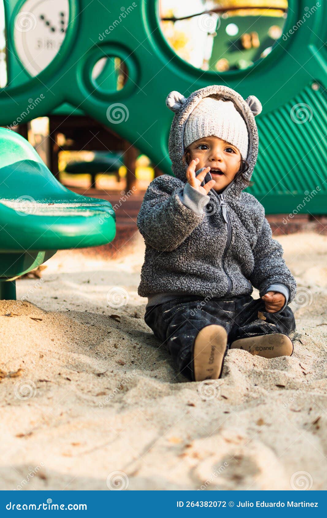 Toddler on Playground Playing with Sand Stock Photo - Image of cold ...
