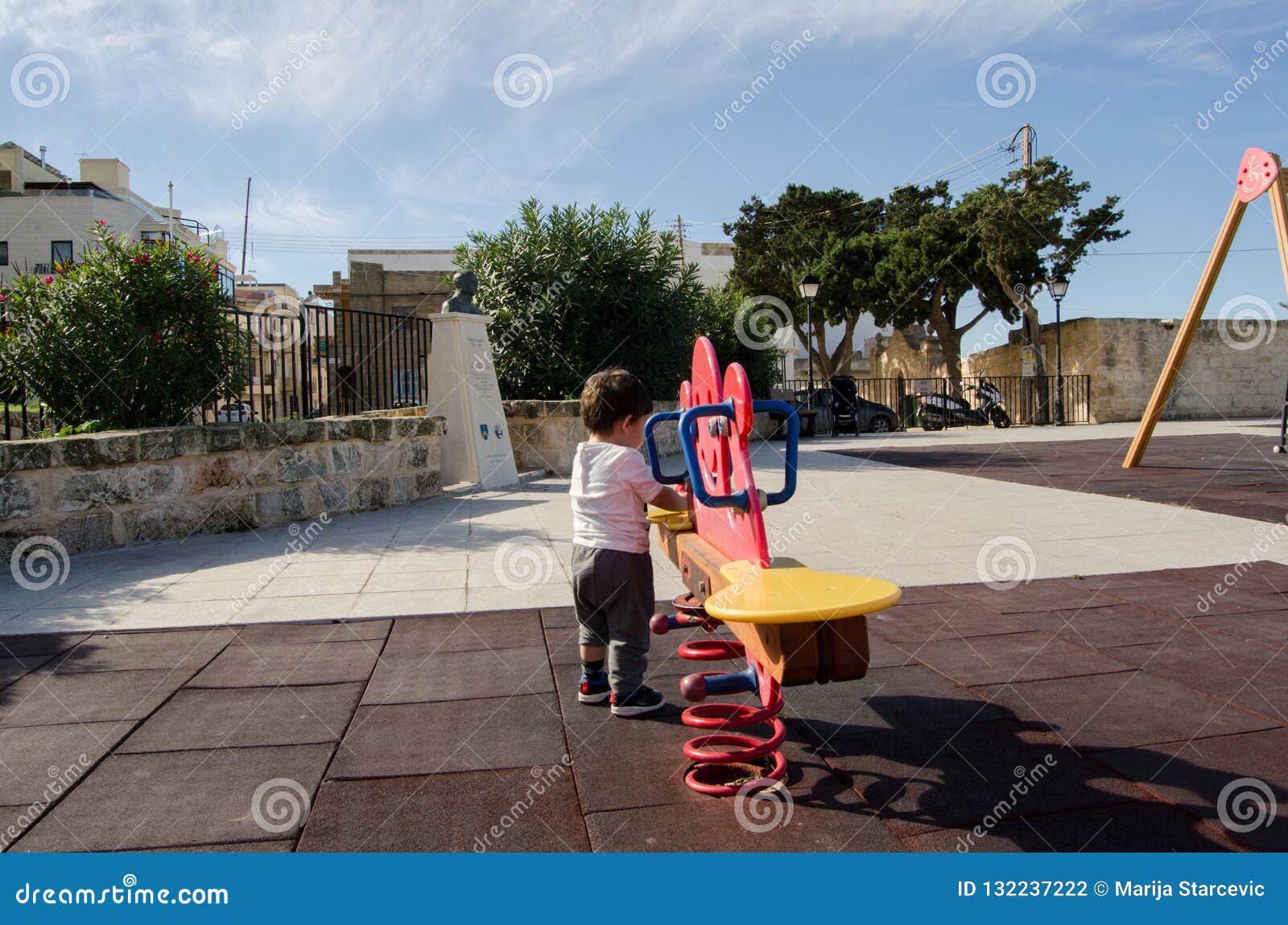 Toddler Playing Alone in the Park - Lonely Child Stock Photo - Image of ...