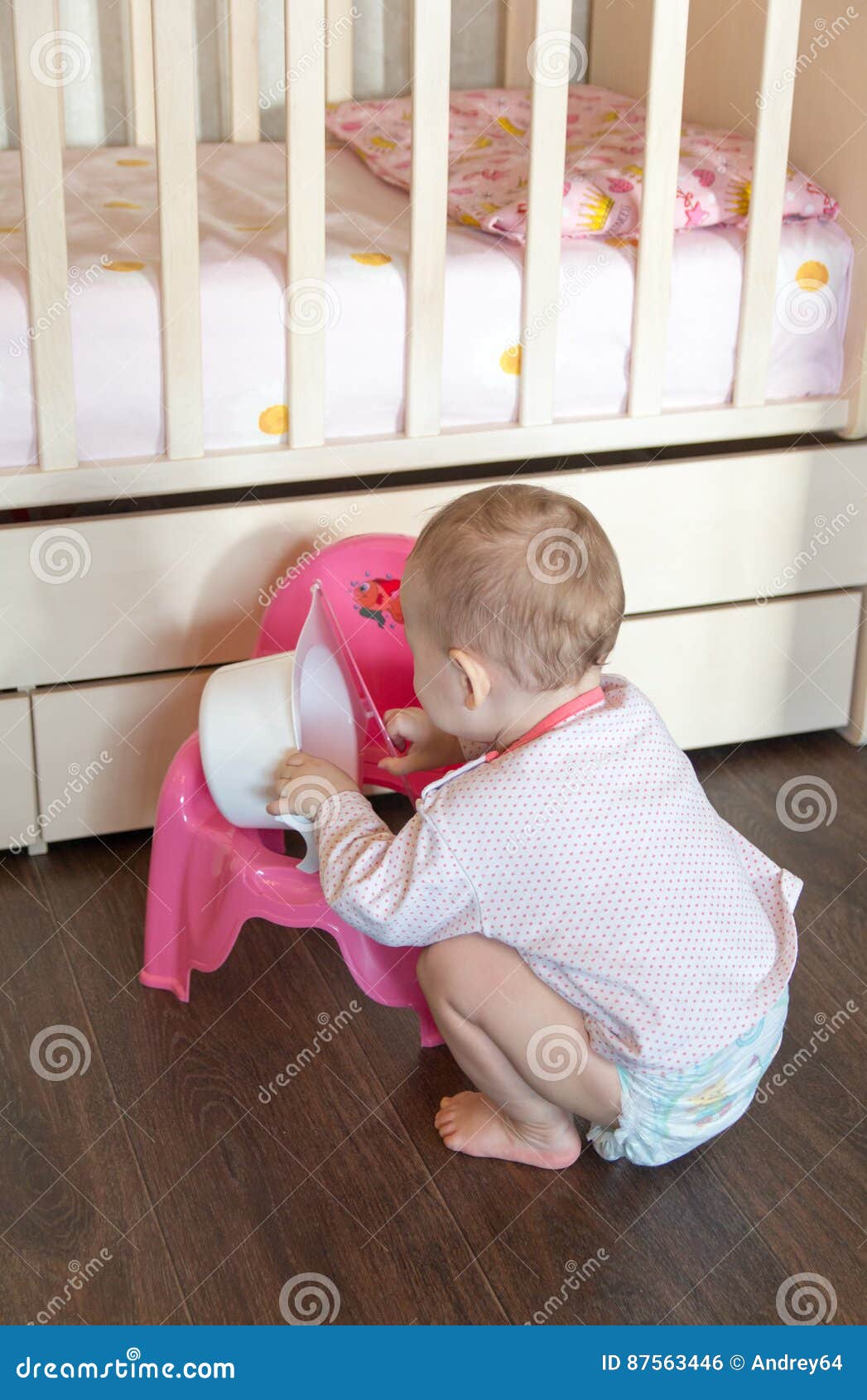 Toddler Playing with Baby Potty Stock Photo - Image of potty, adorable ...