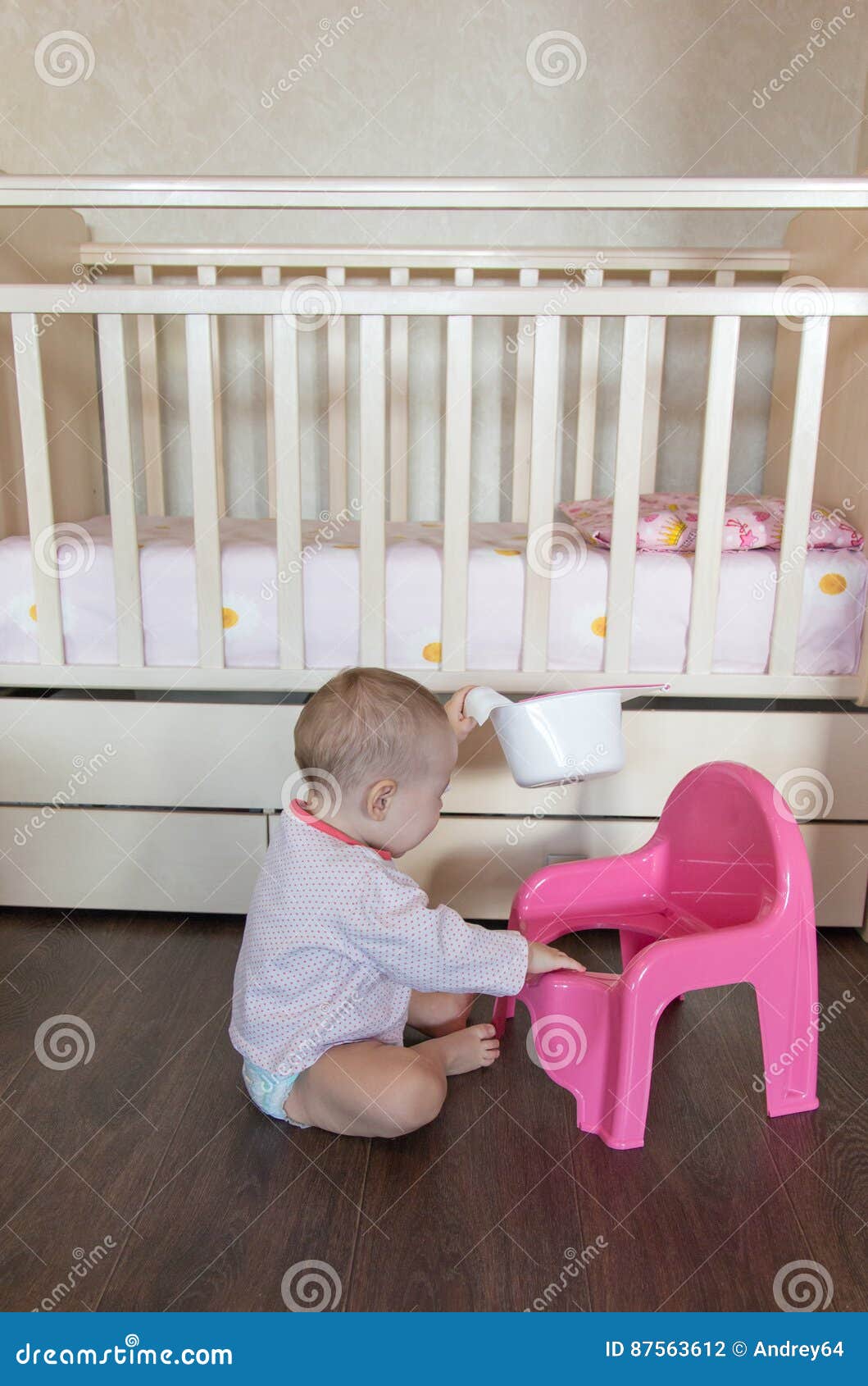 Toddler Playing with Baby Potty Stock Photo - Image of happy, adorable ...