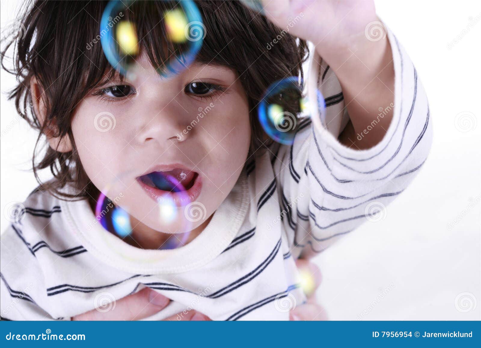 Toddler Playing with Bubbles Stock Photo - Image of multiracial ...