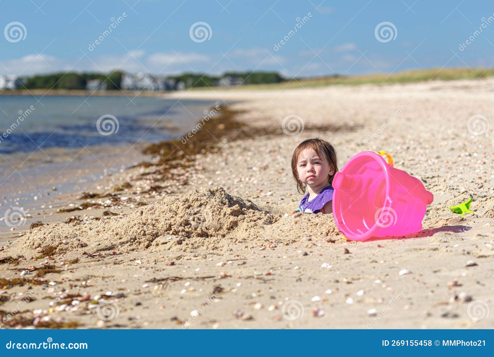 Toddler Playing and Digging in Sand at Beach, Sitting in Hole with Head ...