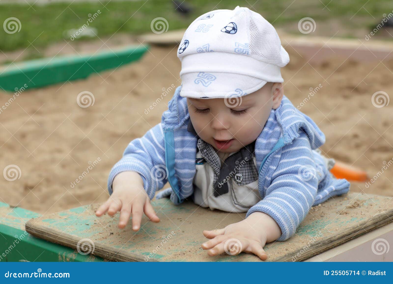 Toddler playing in sandbox stock photo. Image of innocence - 25505714