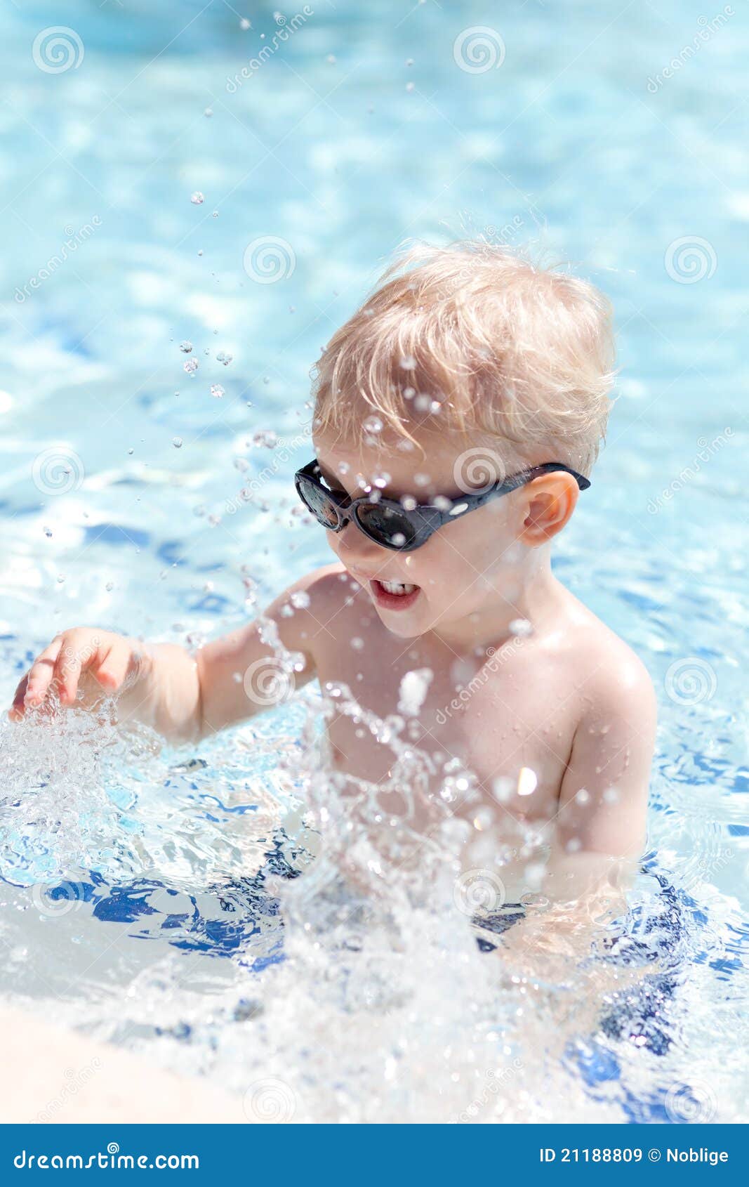 Toddler in a pool stock image. Image of happiness, childhood - 21188809