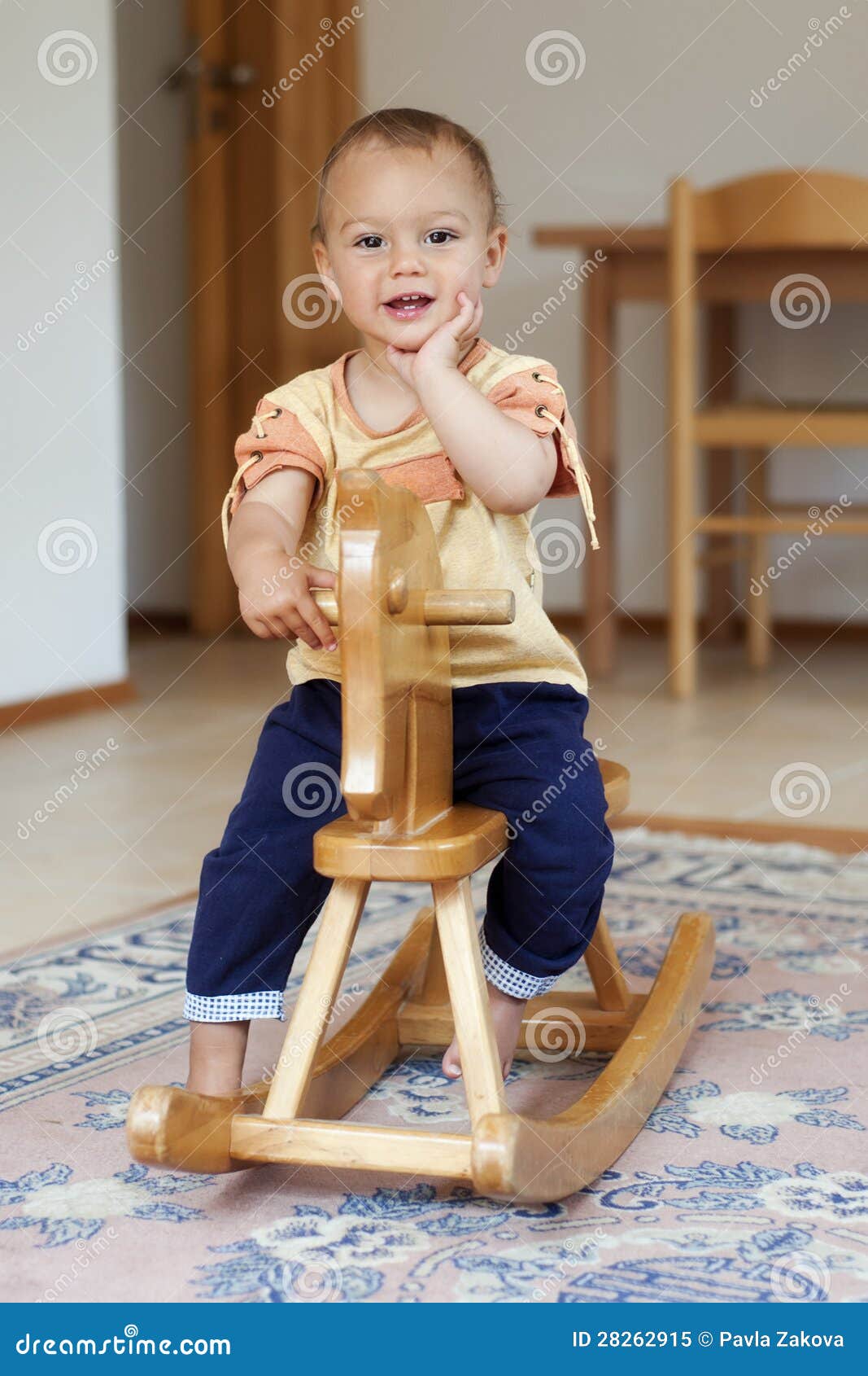Toddler on rocking horse stock image. Image of horse - 28262915
