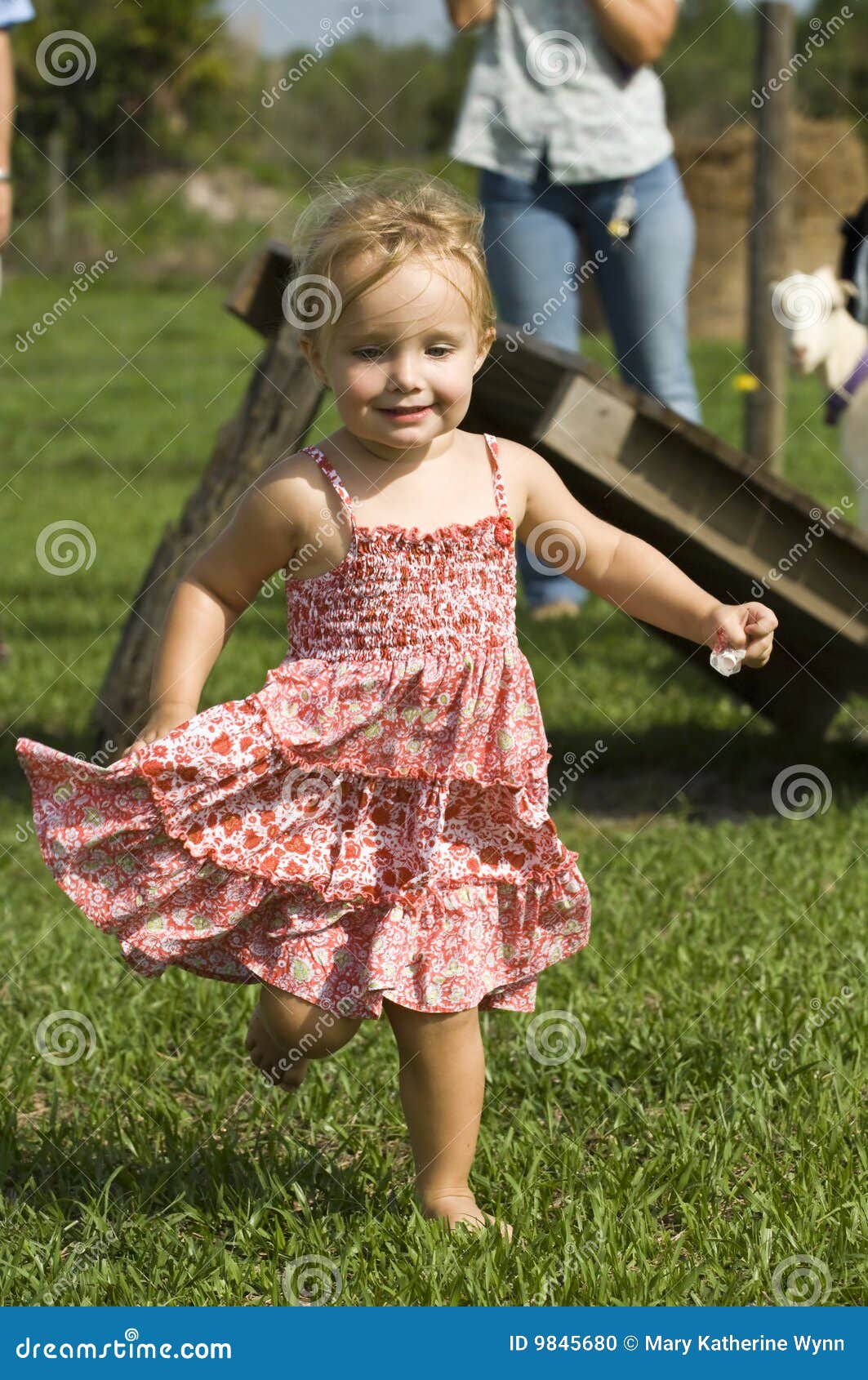 Toddler running outdoors stock photo. Image of outdoors - 9845680