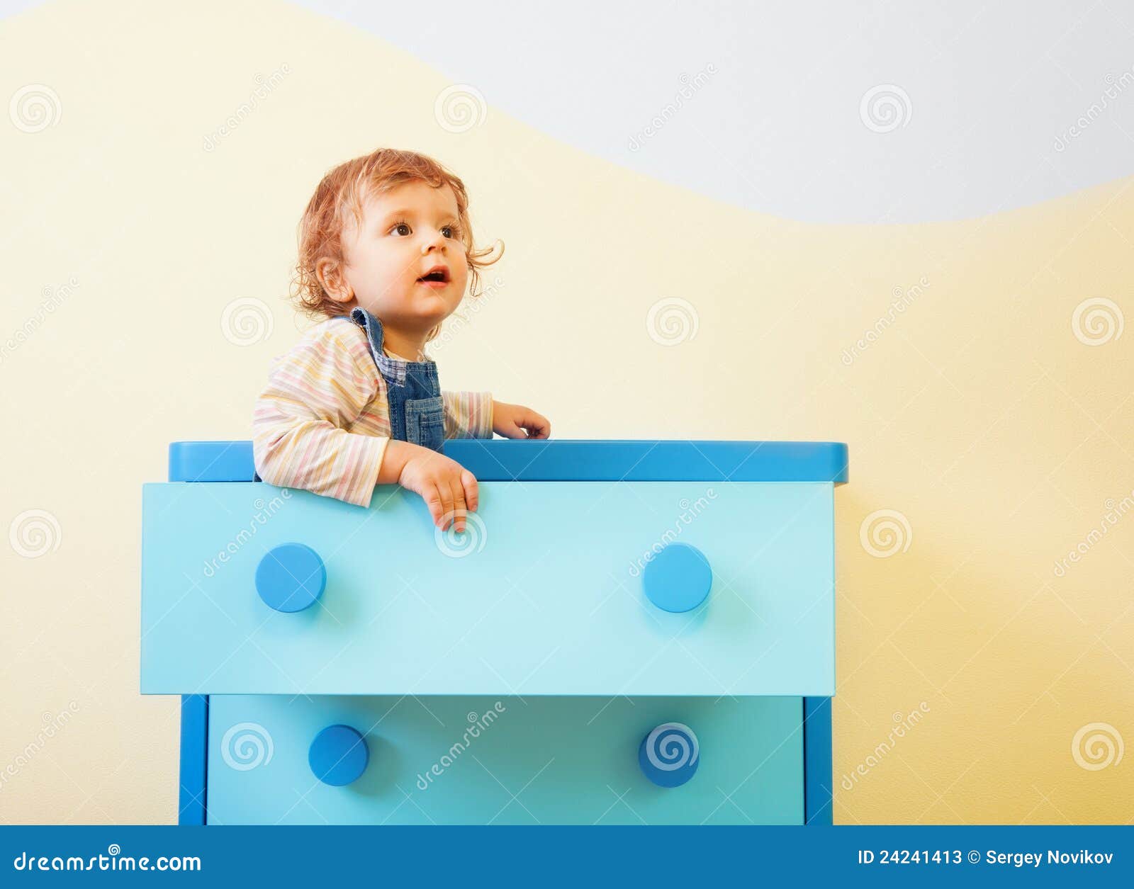 Toddler sitting in the box stock image. Image of close - 24241413