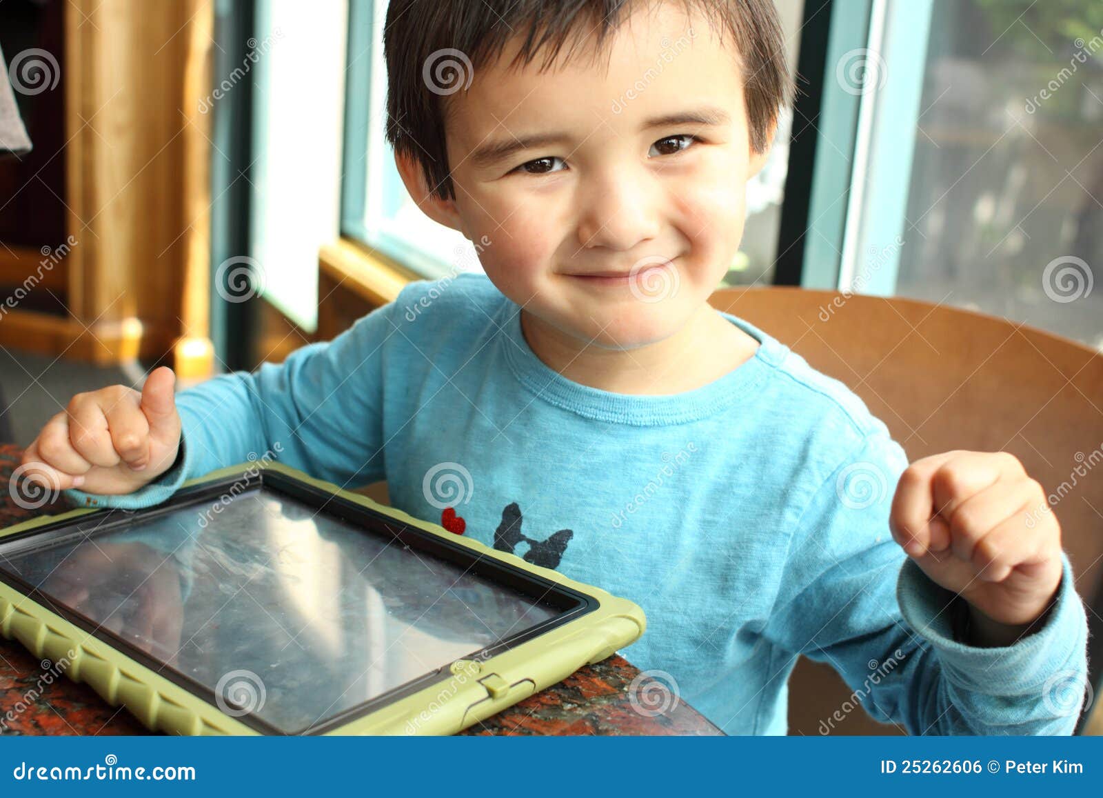 Toddler with tablet PC stock photo. Image of table, child - 25262606