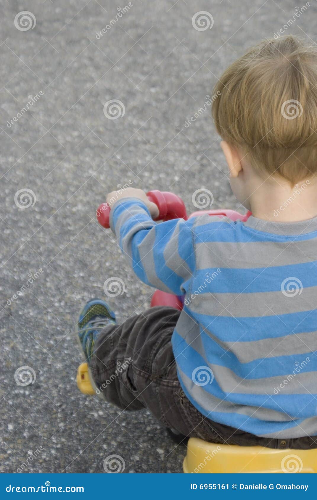Toddler on Tricycle Back View Stock Image - Image of back, brown: 6955161