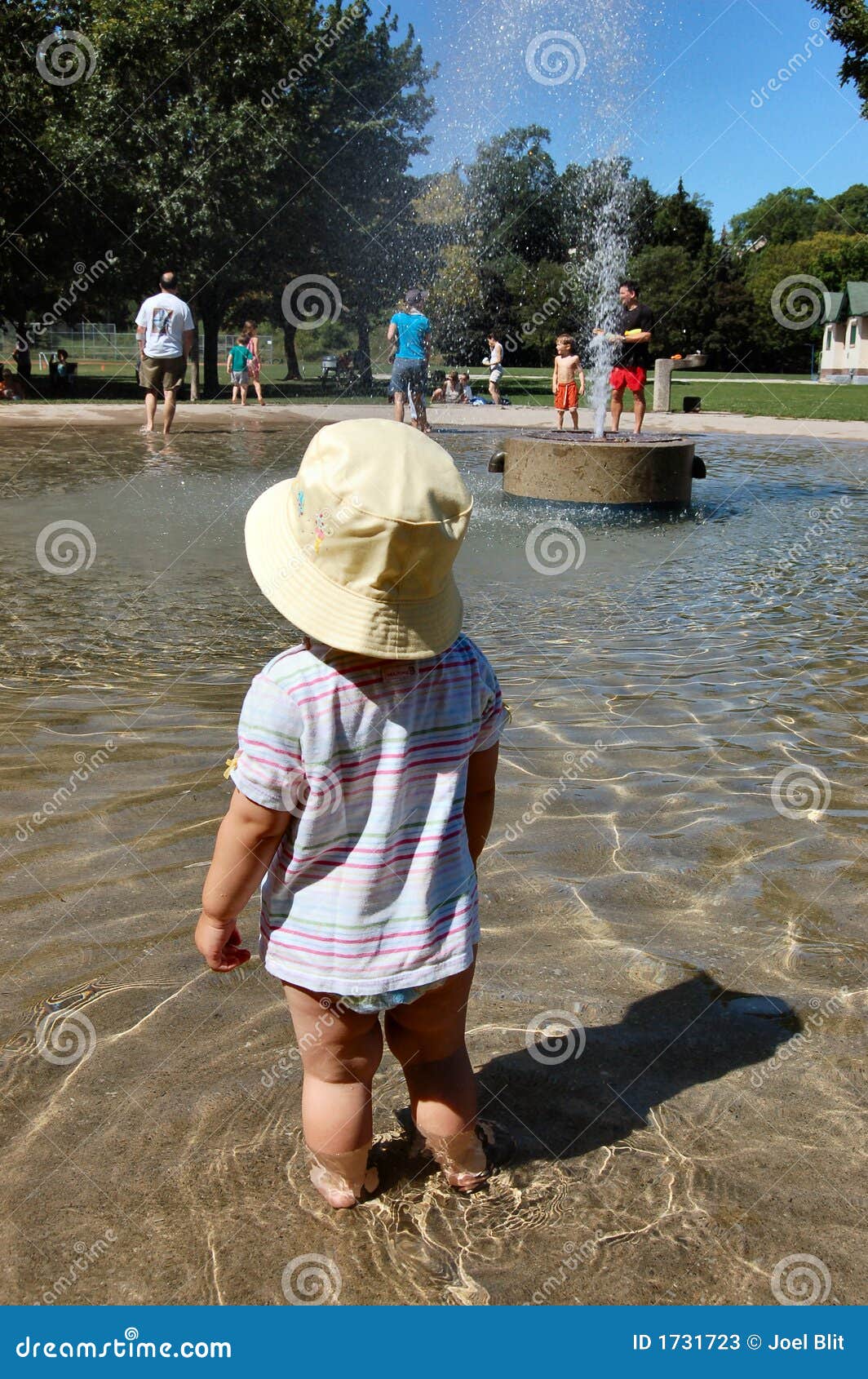 Toddler in wading pool stock image. Image of childhood - 1731723