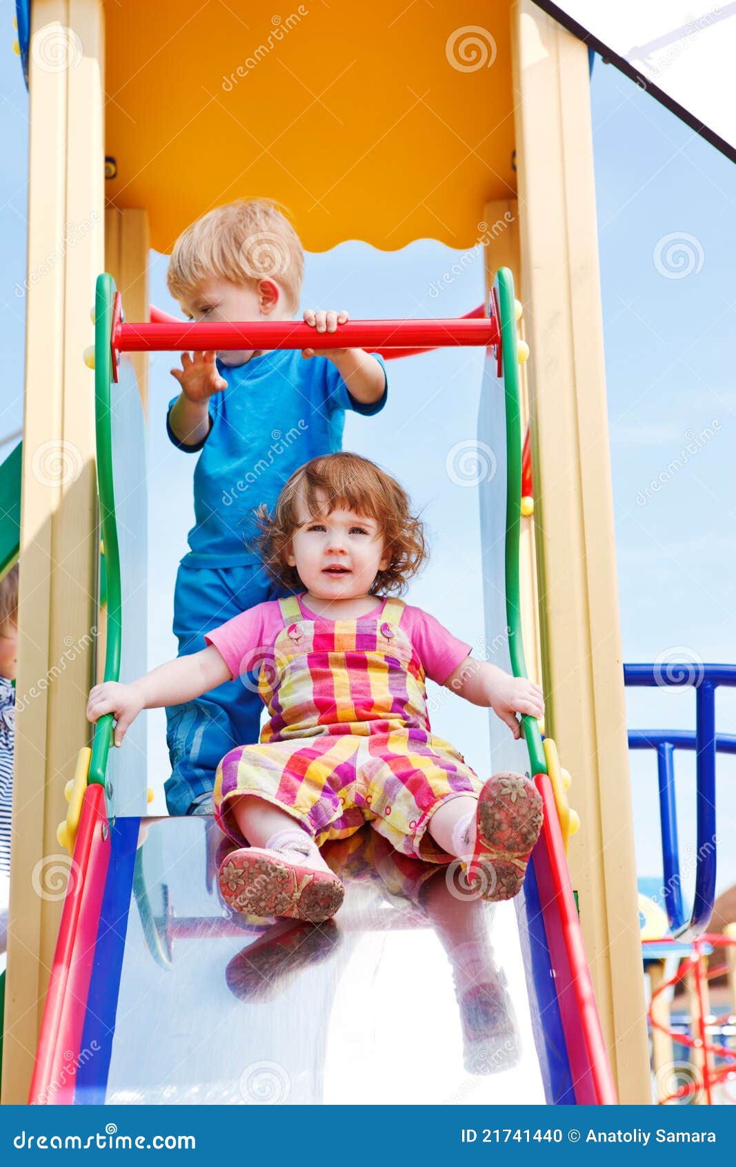 Toddlers on a chute stock photo. Image of cute, girl - 21741440