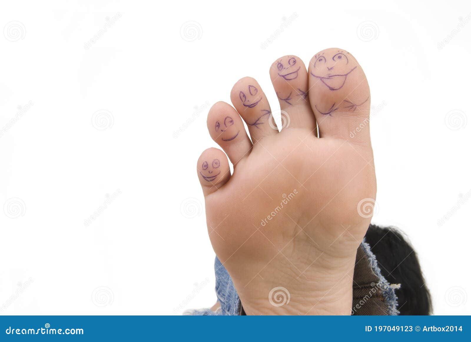 Toes on a Female Leg with Painted Faces on a White Background Stock ...