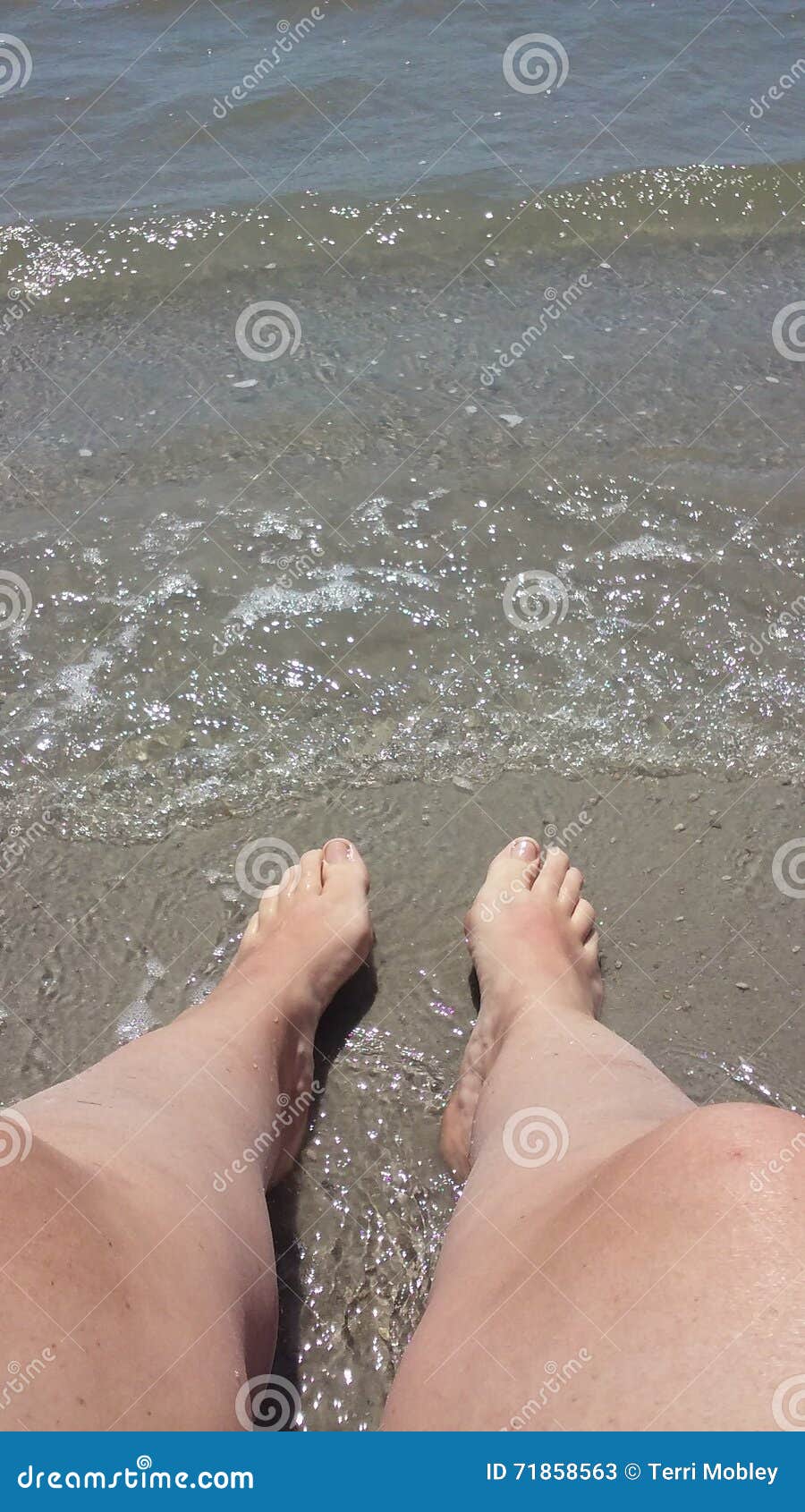 Toes in the water stock image. Image of relaxing, ocean - 71858563