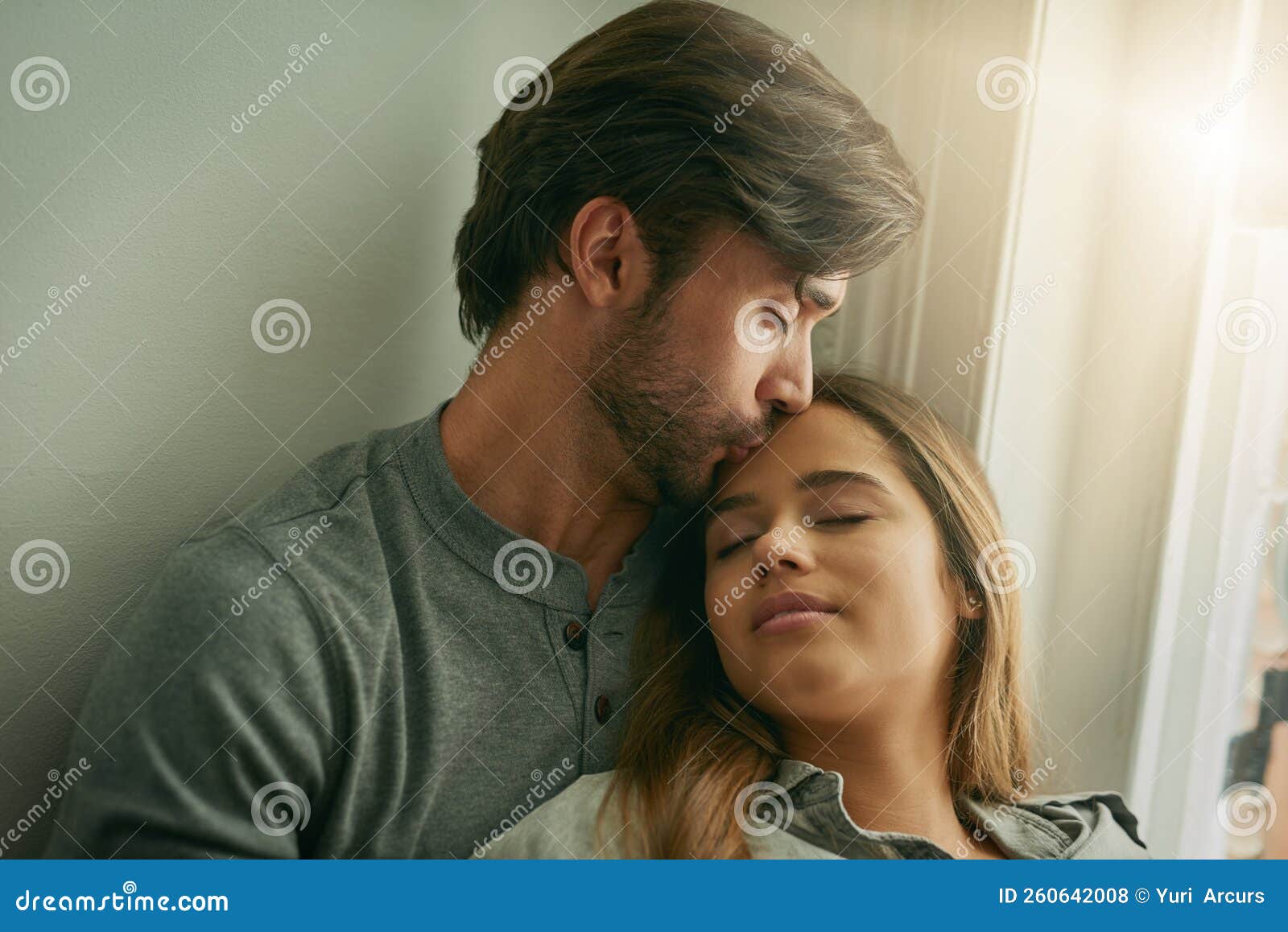 Together, always. an Affectionate Young Couple Relaxing and Holding ...