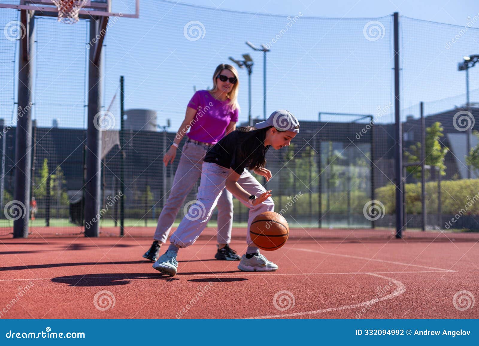 Together is Better. Family Playing Basketball Together. Stock Photo ...