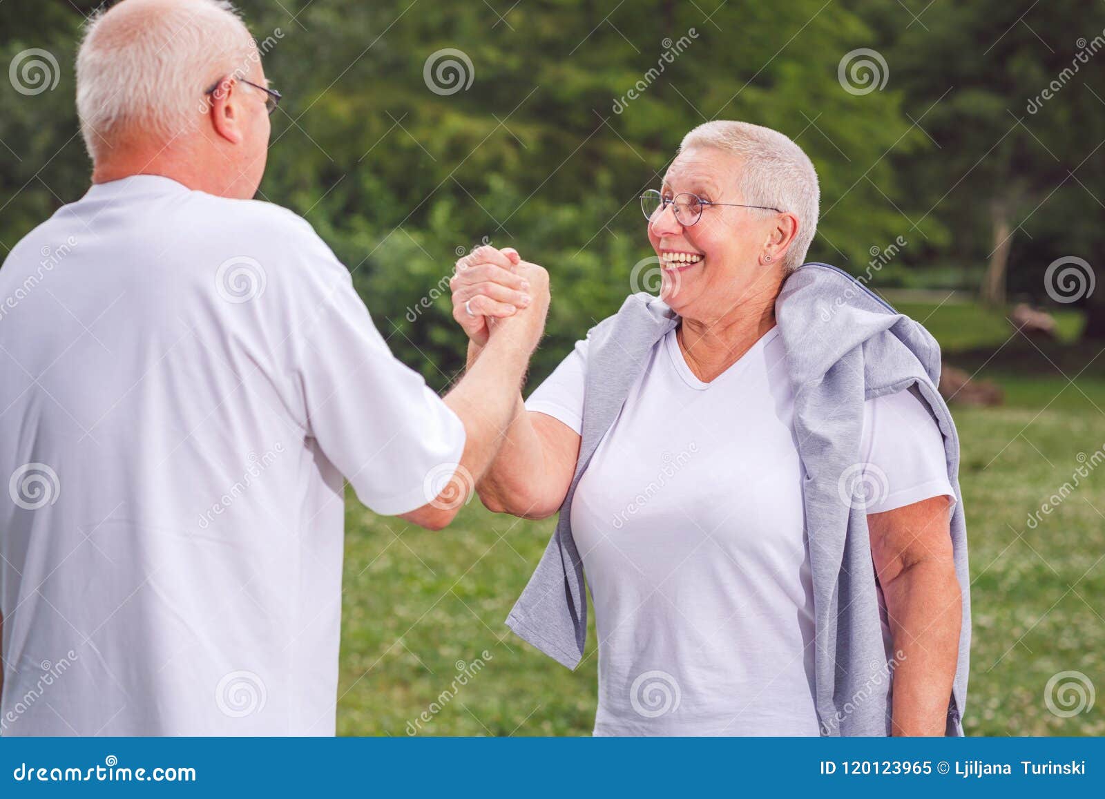 Together we Workout Better- Senior Couple Exercise and Having Fun ...