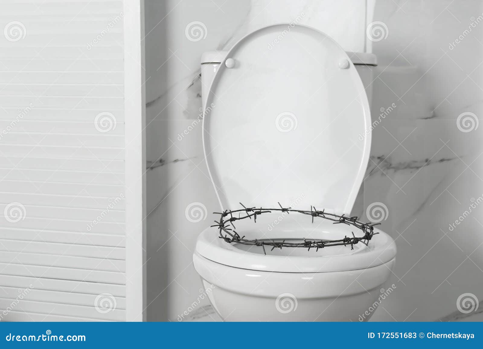 Toilet Bowl With Barbed Wire In Room Hemorrhoids Concept Stock Image