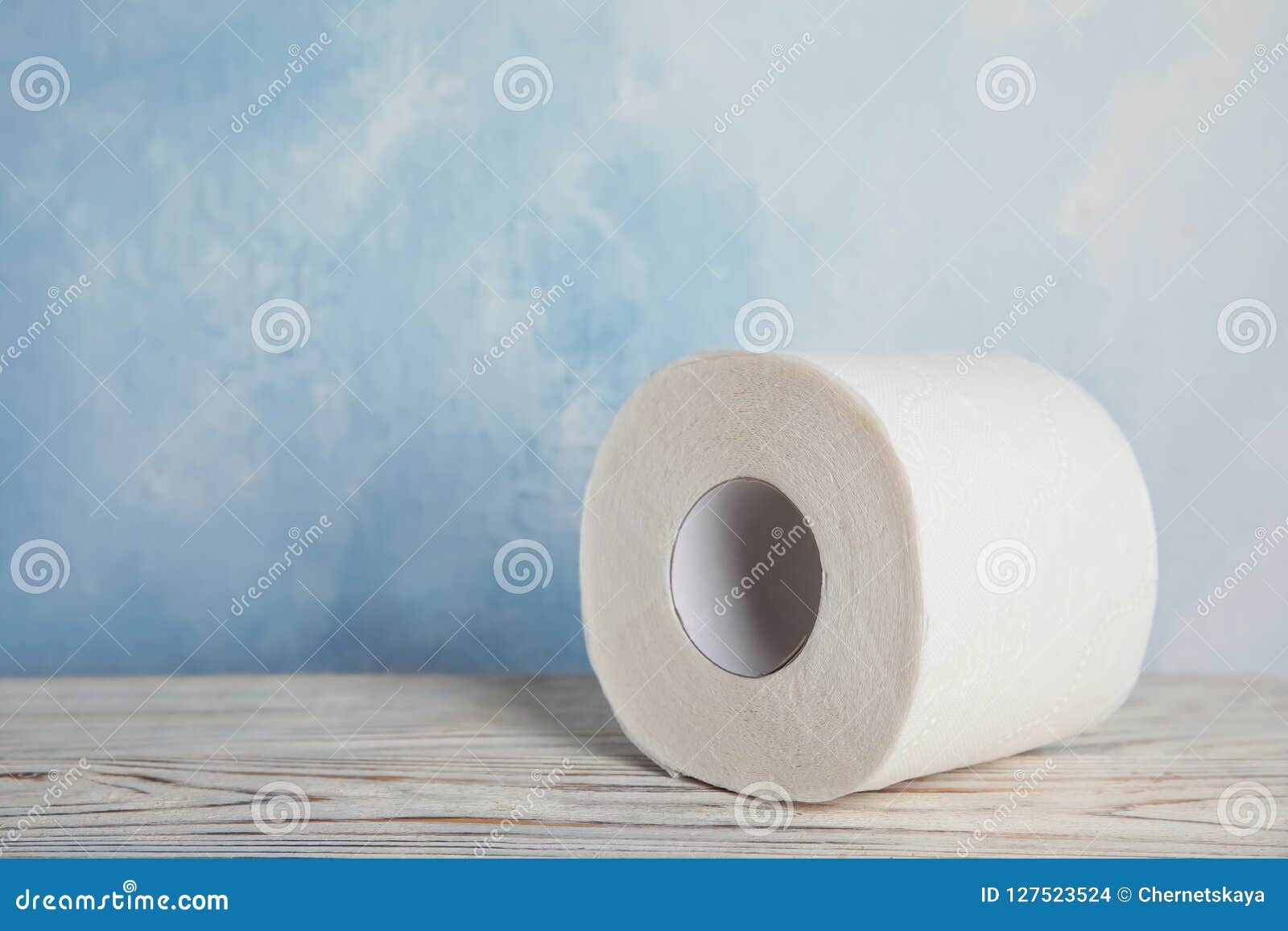 Toilet paper roll on table stock photo. Image of background - 127523524