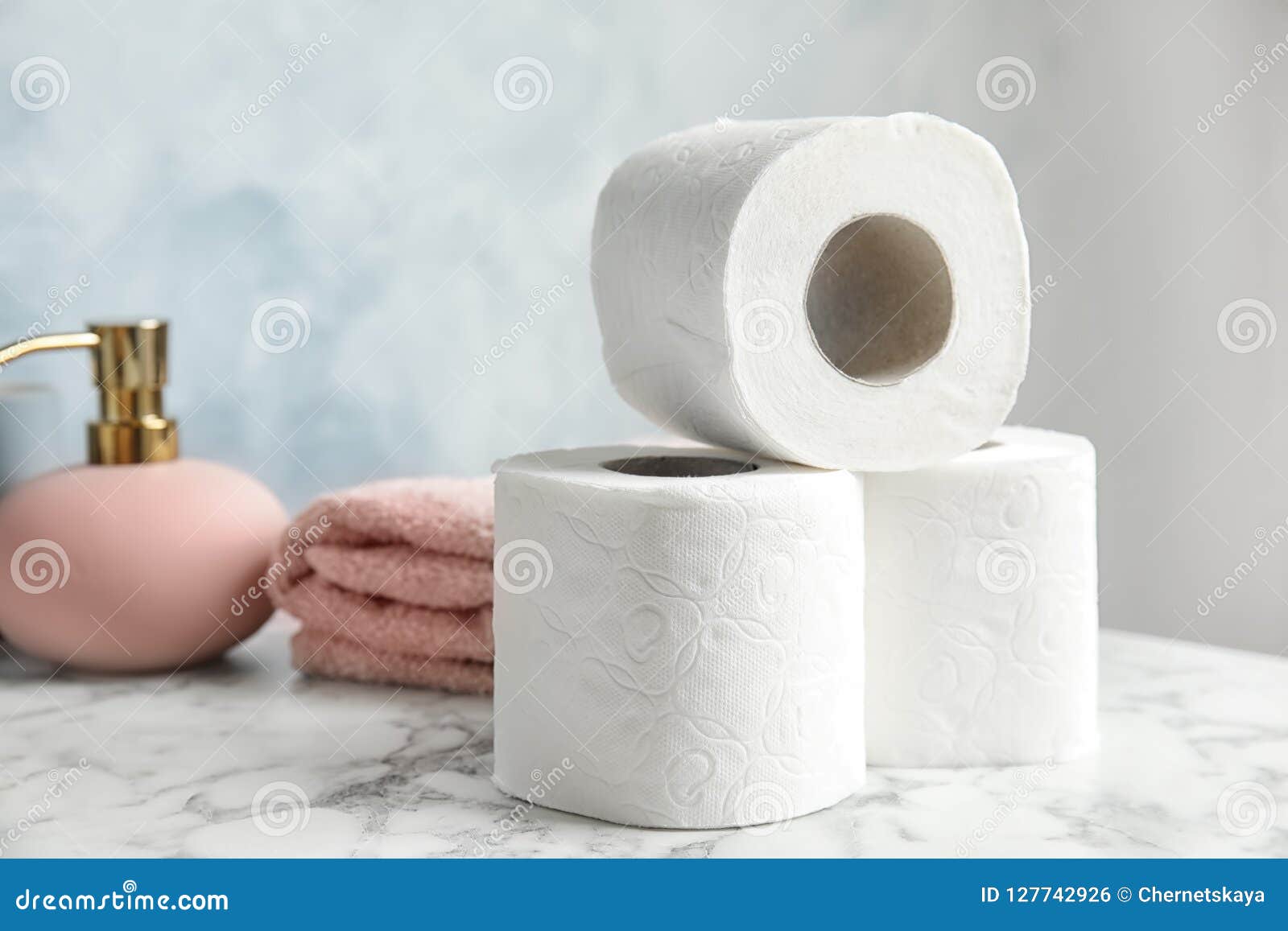 Toilet Paper Rolls on Table Stock Photo - Image of accessory, cleanse ...