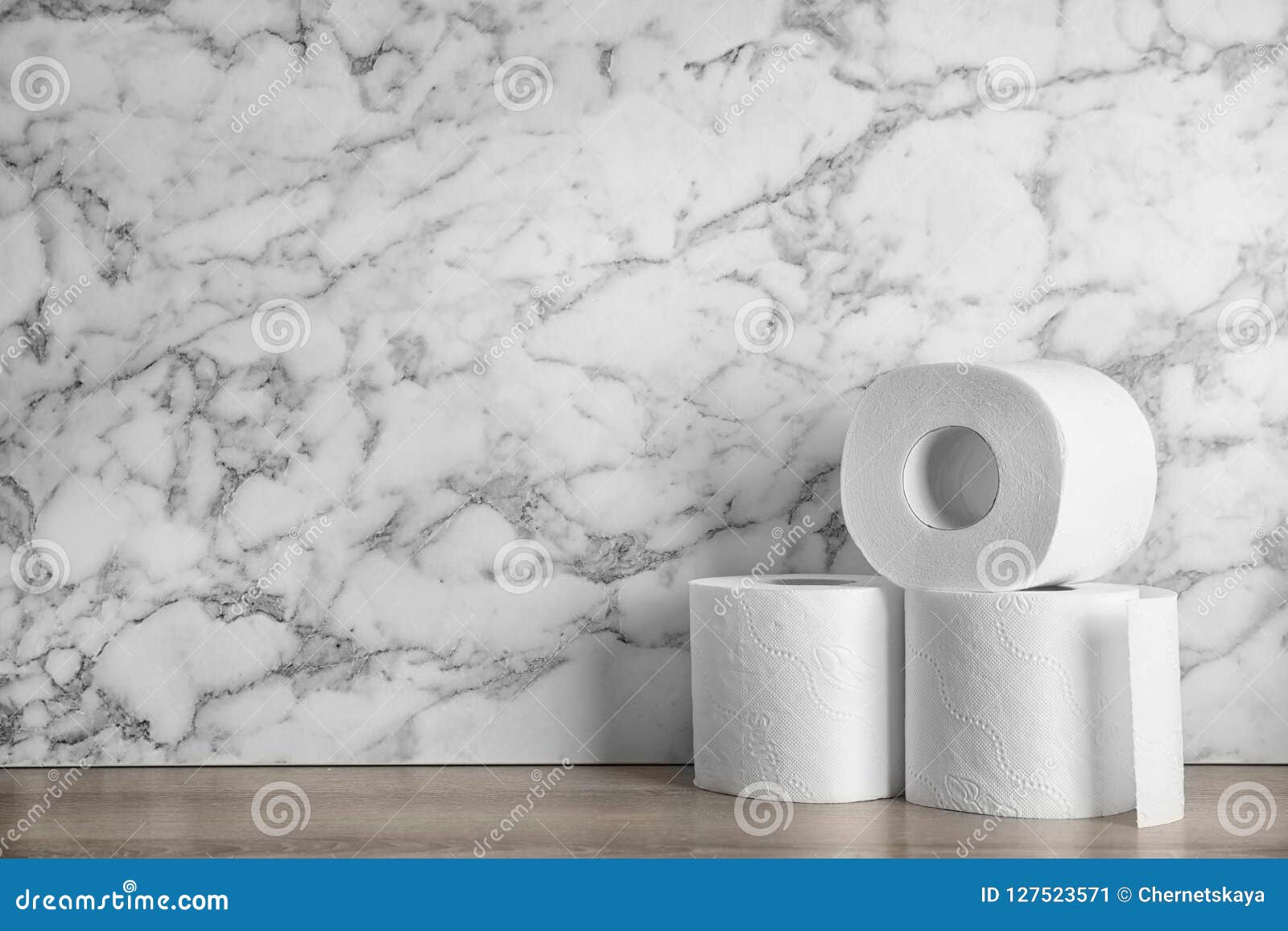 Toilet Paper Rolls on Table Stock Image - Image of soft, rolls: 127523571