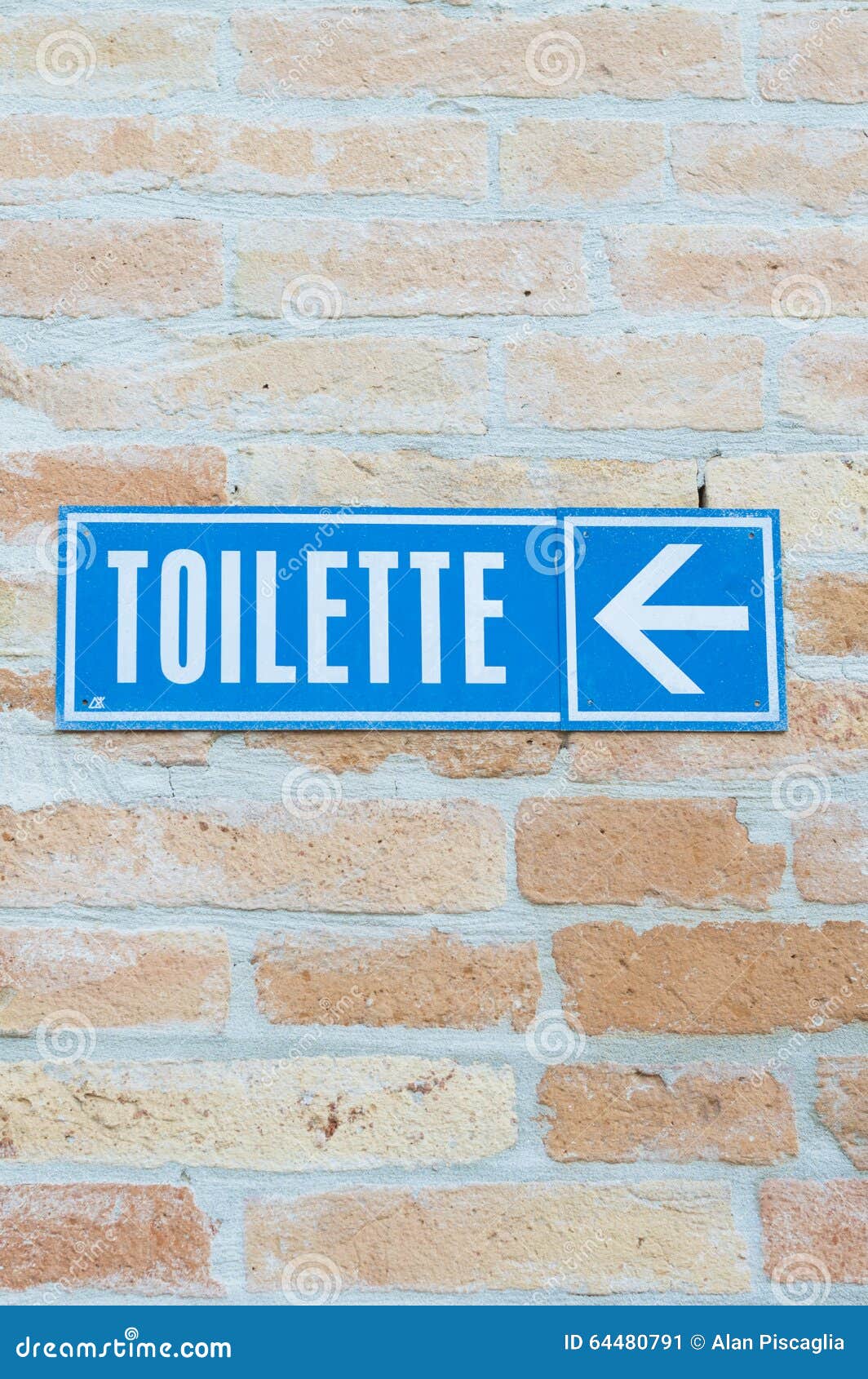 Toilet sign on a wall stock image. Image of symbol, direction - 64480791