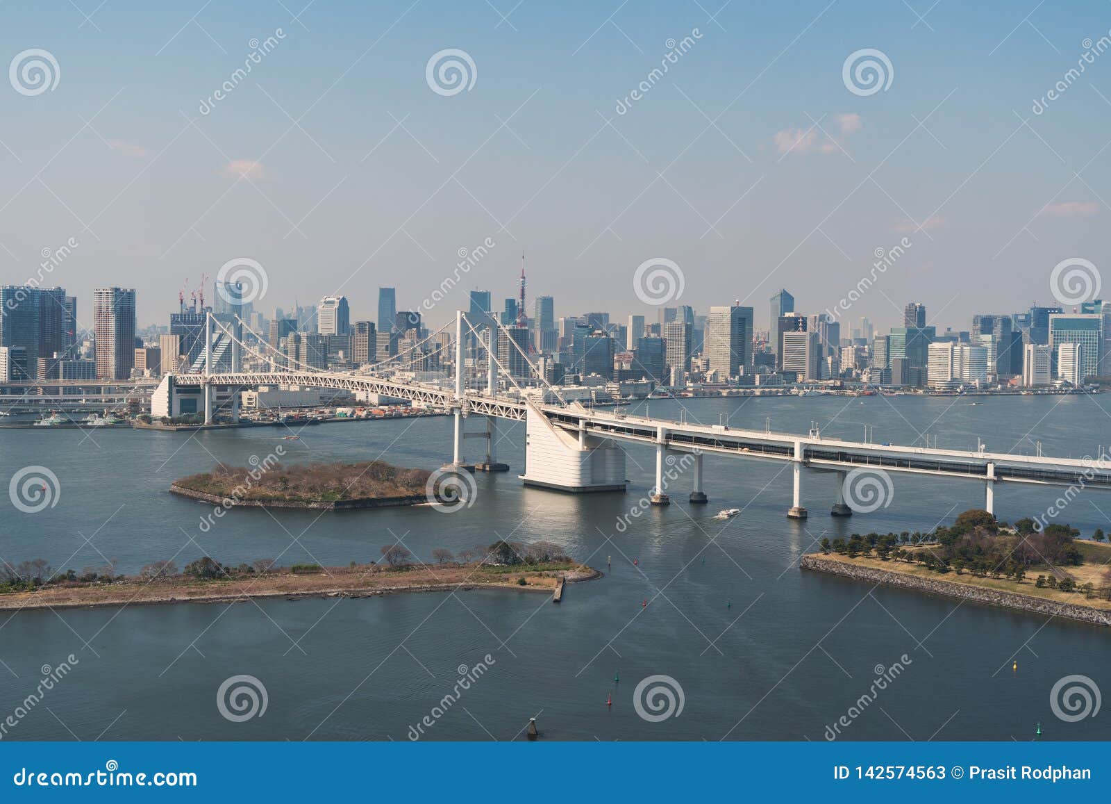 Tokyo Bay with a View of the Tokyo Skyline and Rainbow Bridge in Tokyo ...