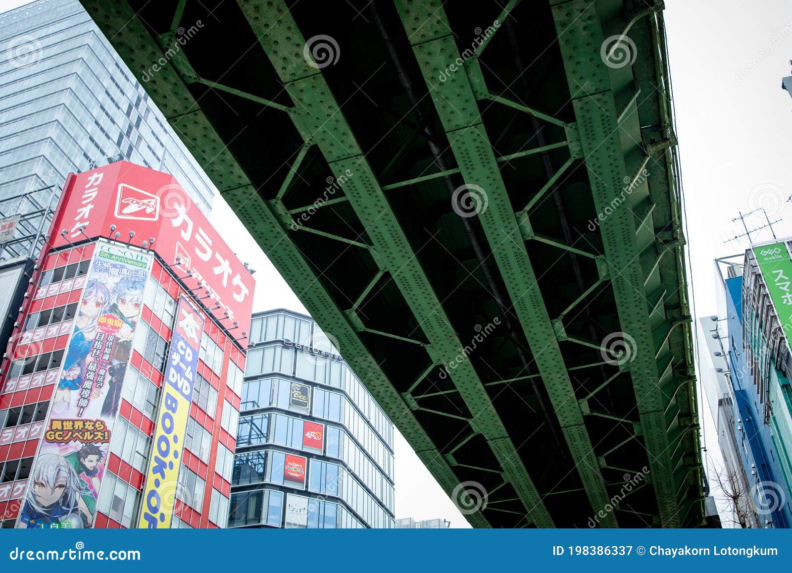 Neon Lights And Billboard Advertisements On Buildings At Akihabara