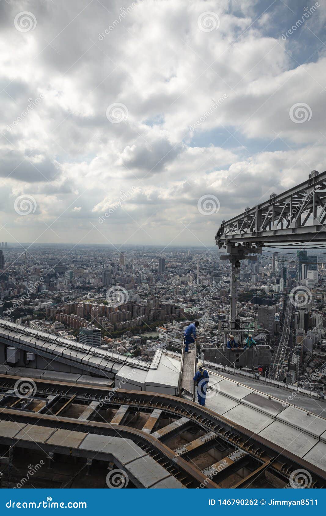 Worker Cleaning the Window of the High Building in Tokyo Japan ...